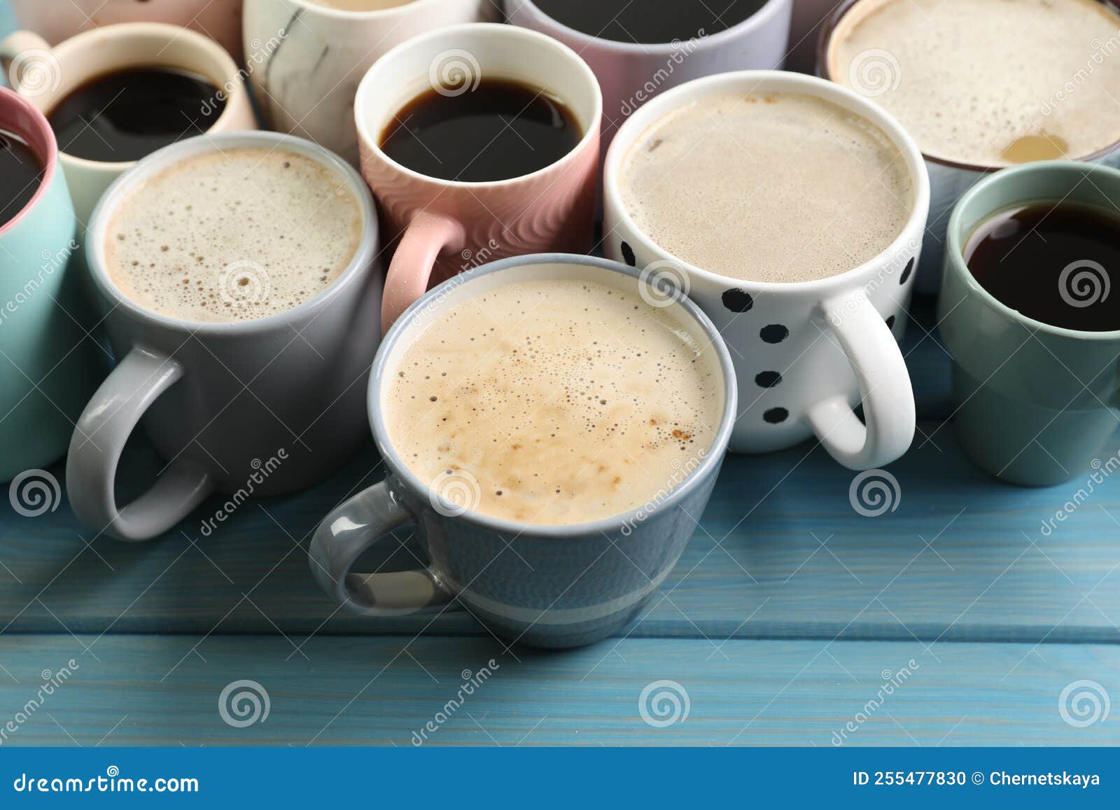 Many Cups of Different Coffee Drinks on Light Blue Wooden Table Stock ...