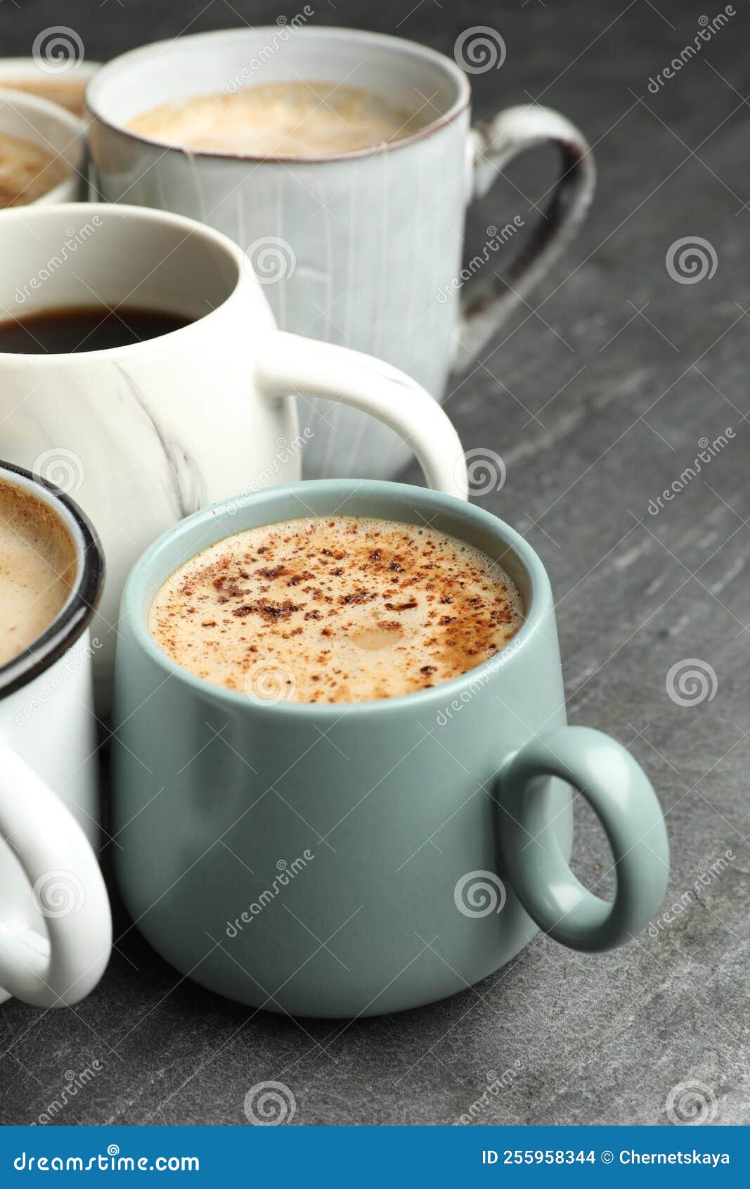 Many Cups of Different Coffees on Slate Table, Closeup Stock Photo ...