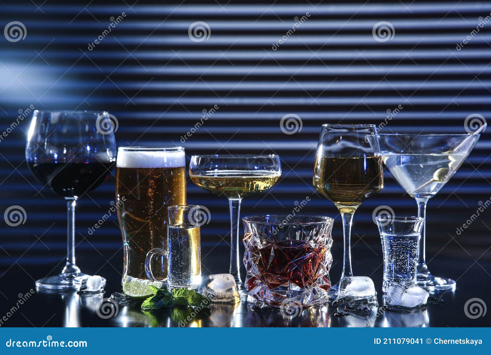 Many Different Alcoholic Drinks on Table Against Dark Background Stock ...