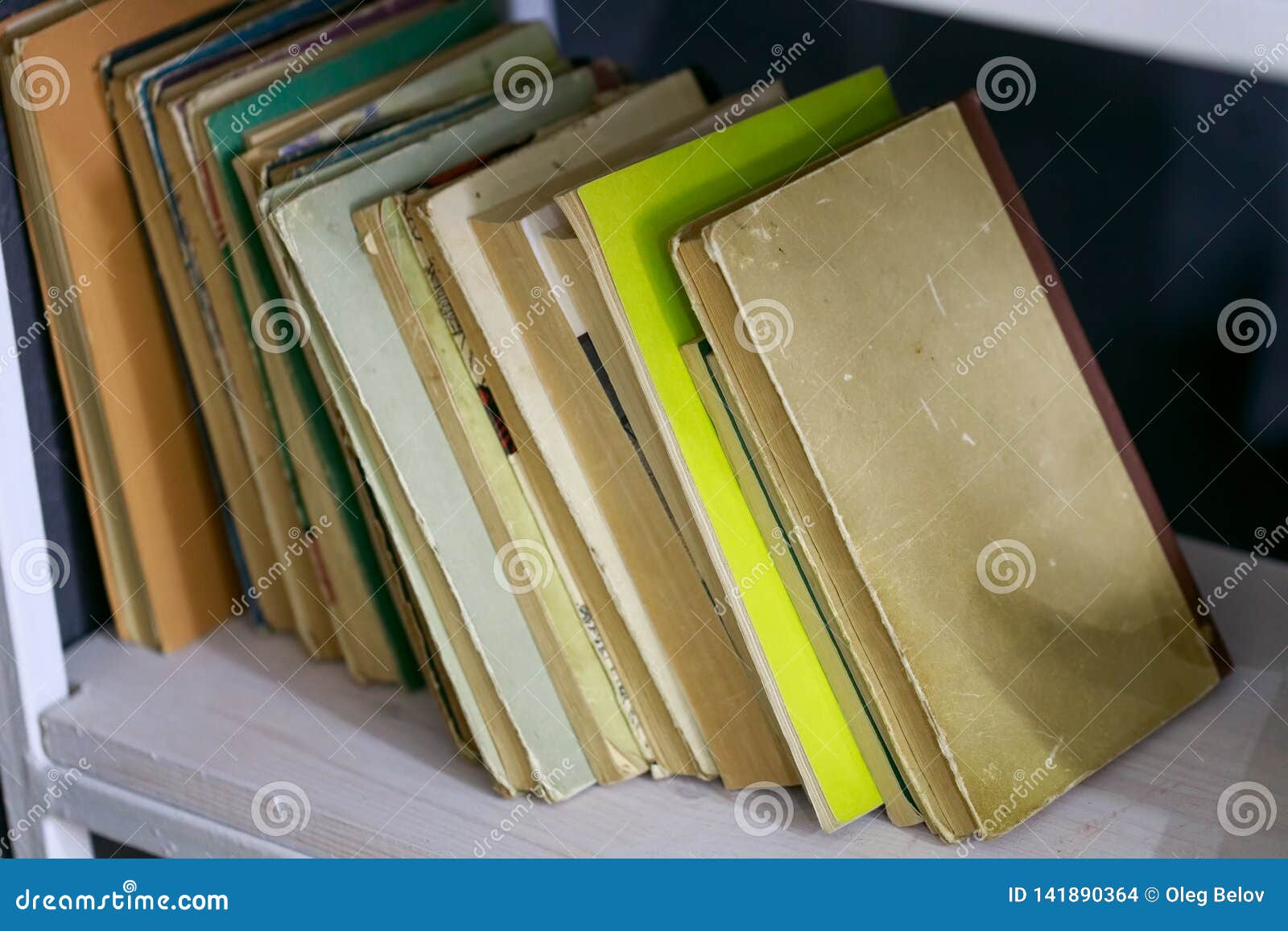 Many Different Books are on the Open Shelf at a Wall Stock Photo ...