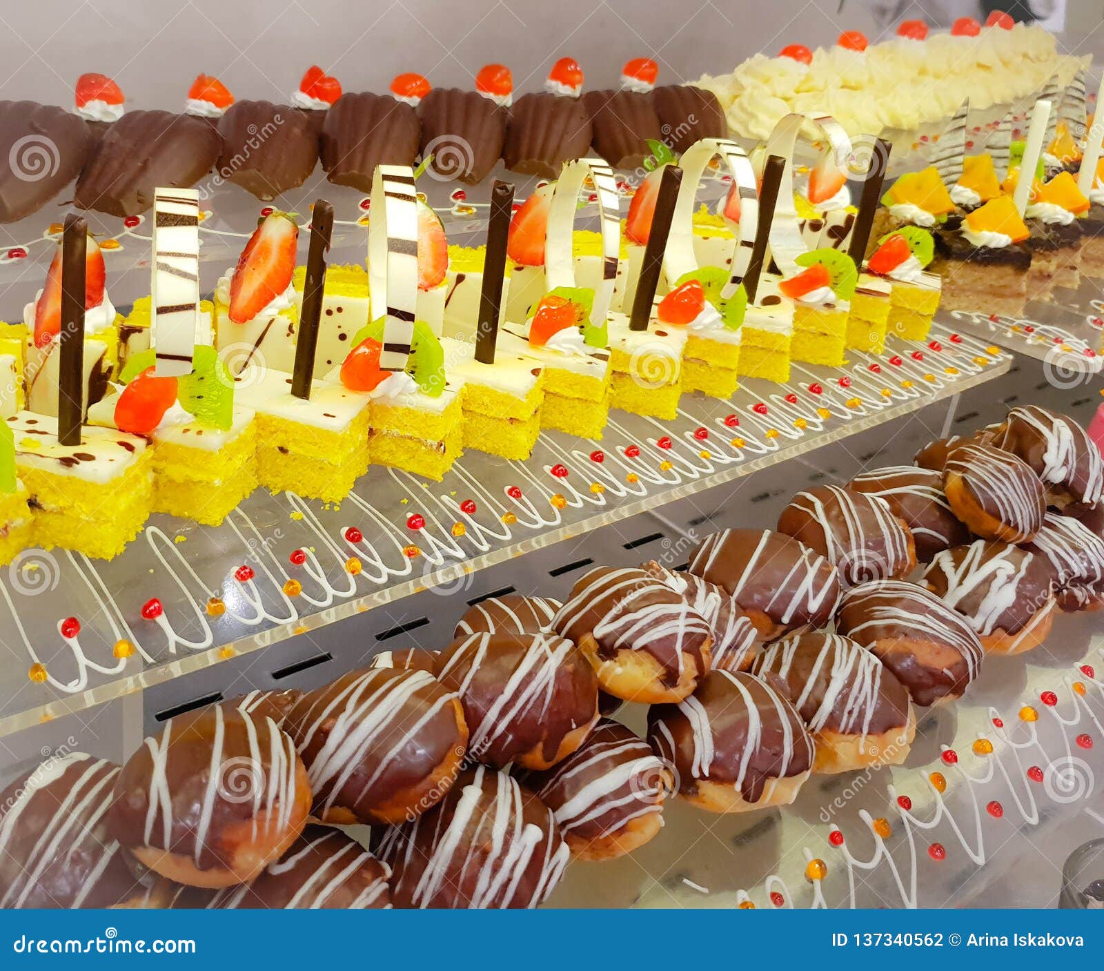 Many different cakes. stock photo. Image of multicolored - 137340562