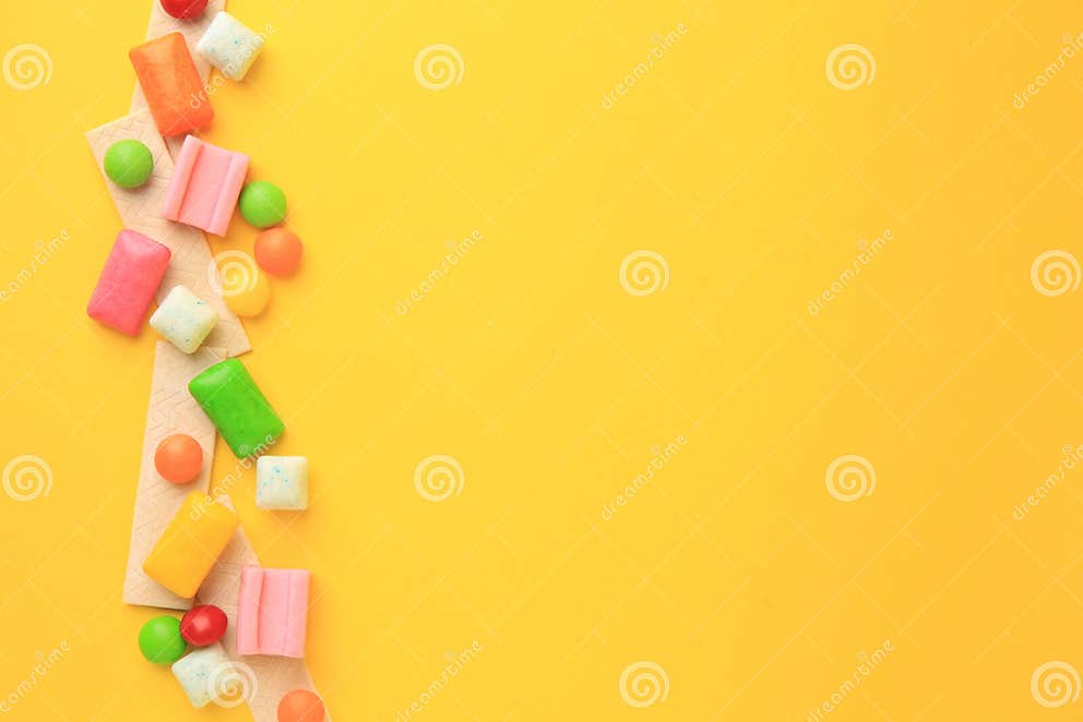 Many Different Chewing Gums on Yellow Background, Flat Lay. Space for ...