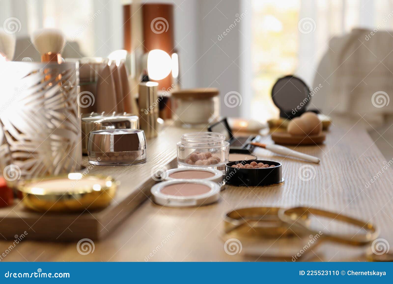 Many Different Cosmetic Products on Dressing Table Indoors Stock Photo ...