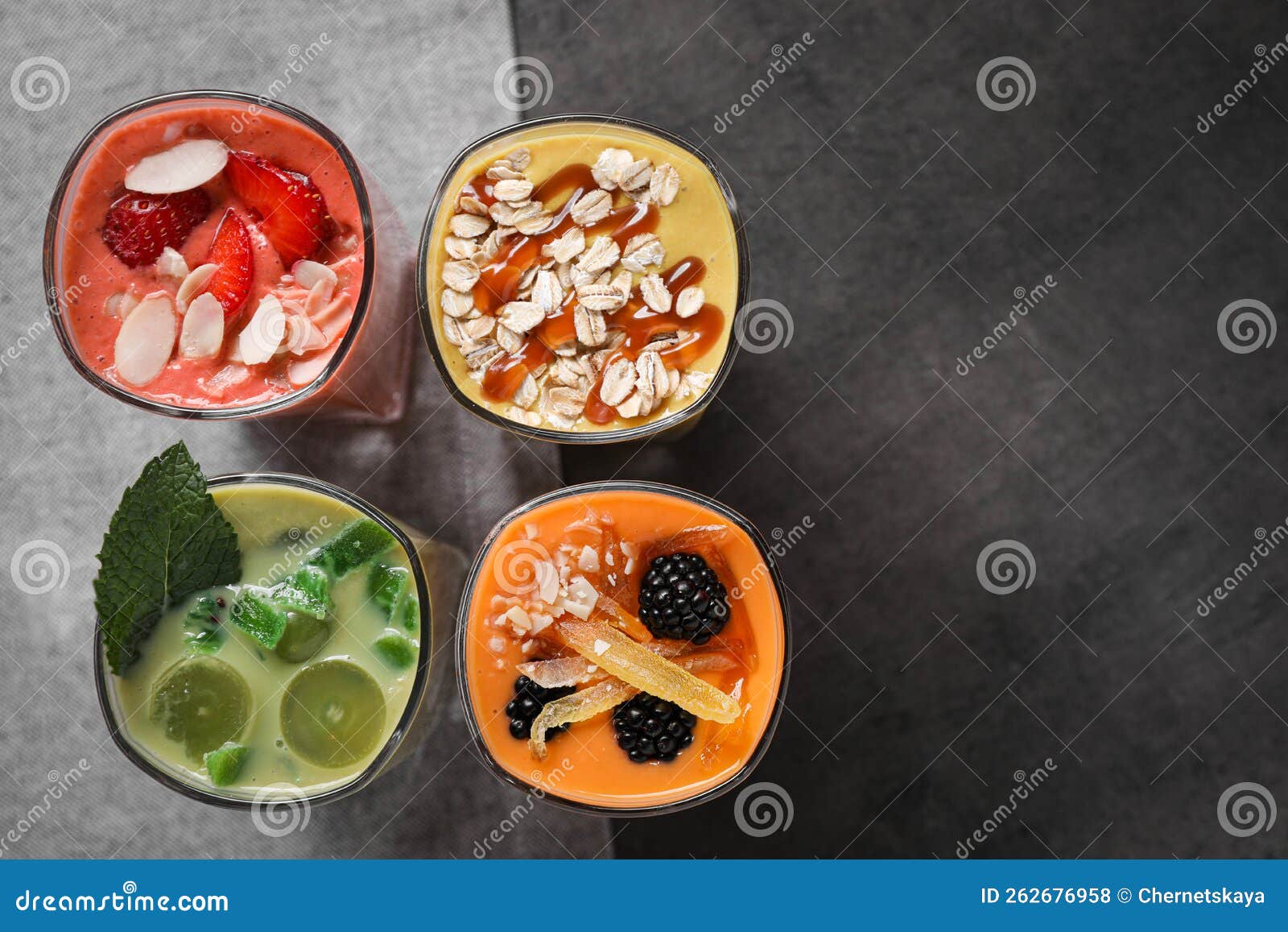 Many Different Delicious Smoothies on Grey Table, Flat Lay. Space for ...