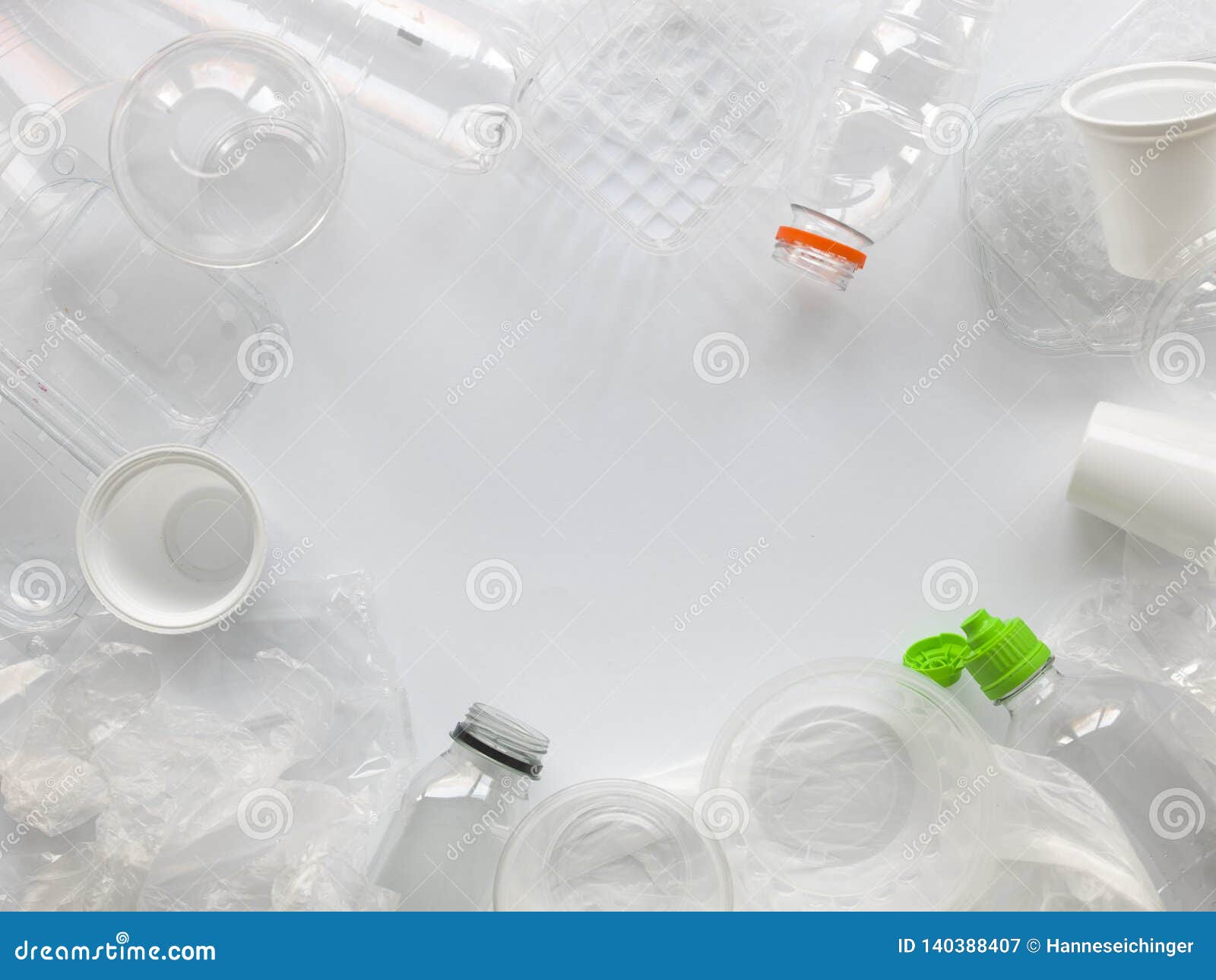 Many Different Empty Plastic Bottles and Packages Lying on a White ...