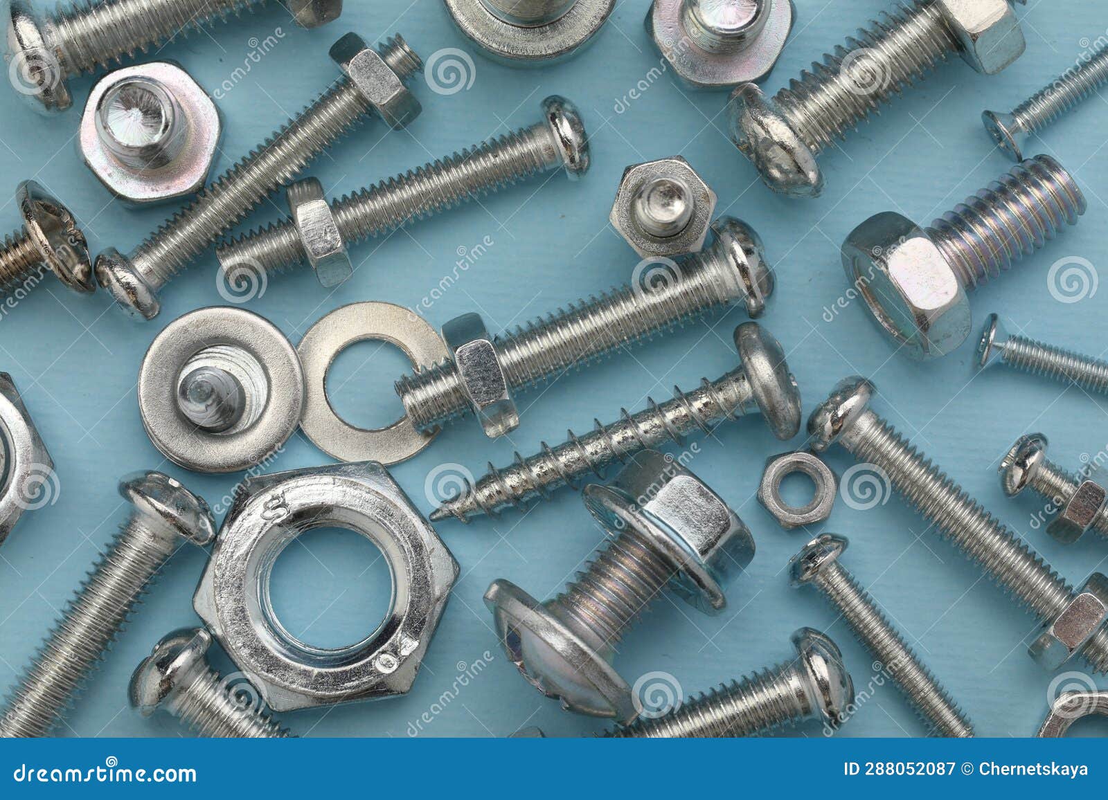 Many Different Fasteners on Light Blue Background, Flat Lay Stock Image ...