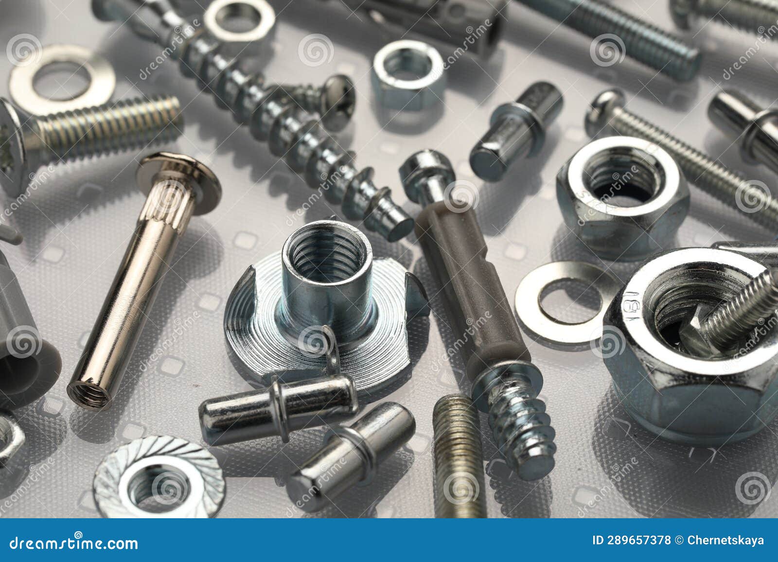 Many Different Fasteners on Plastic Surface, Closeup Stock Photo ...