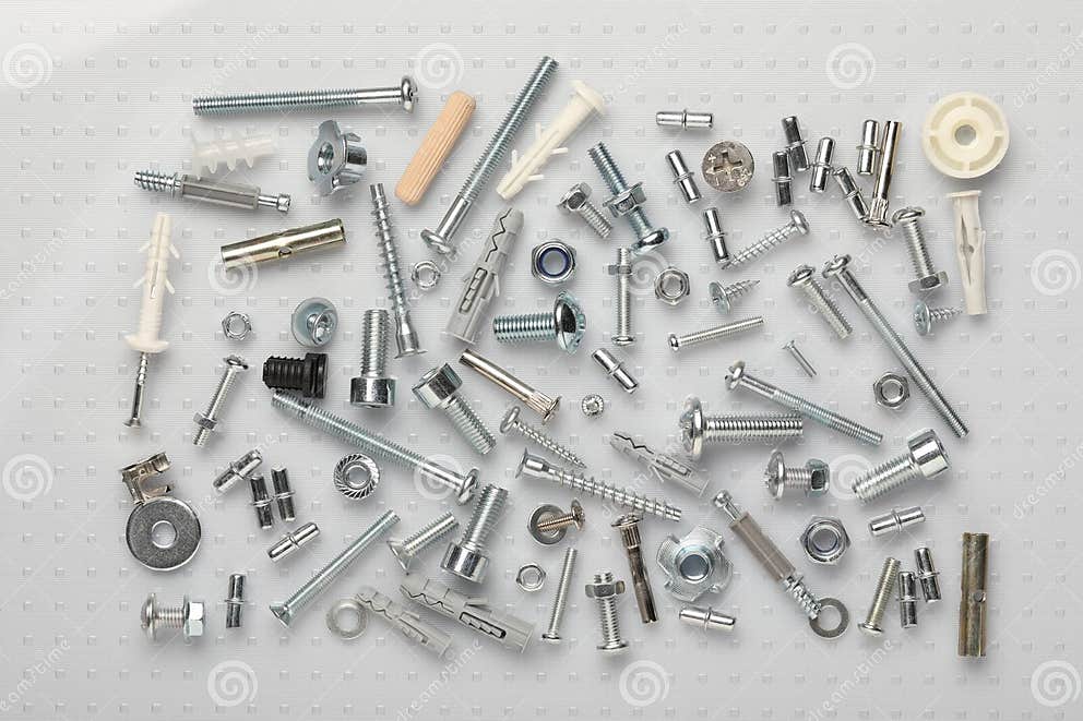Many Different Fasteners on Plastic Surface, Flat Lay Stock Photo ...