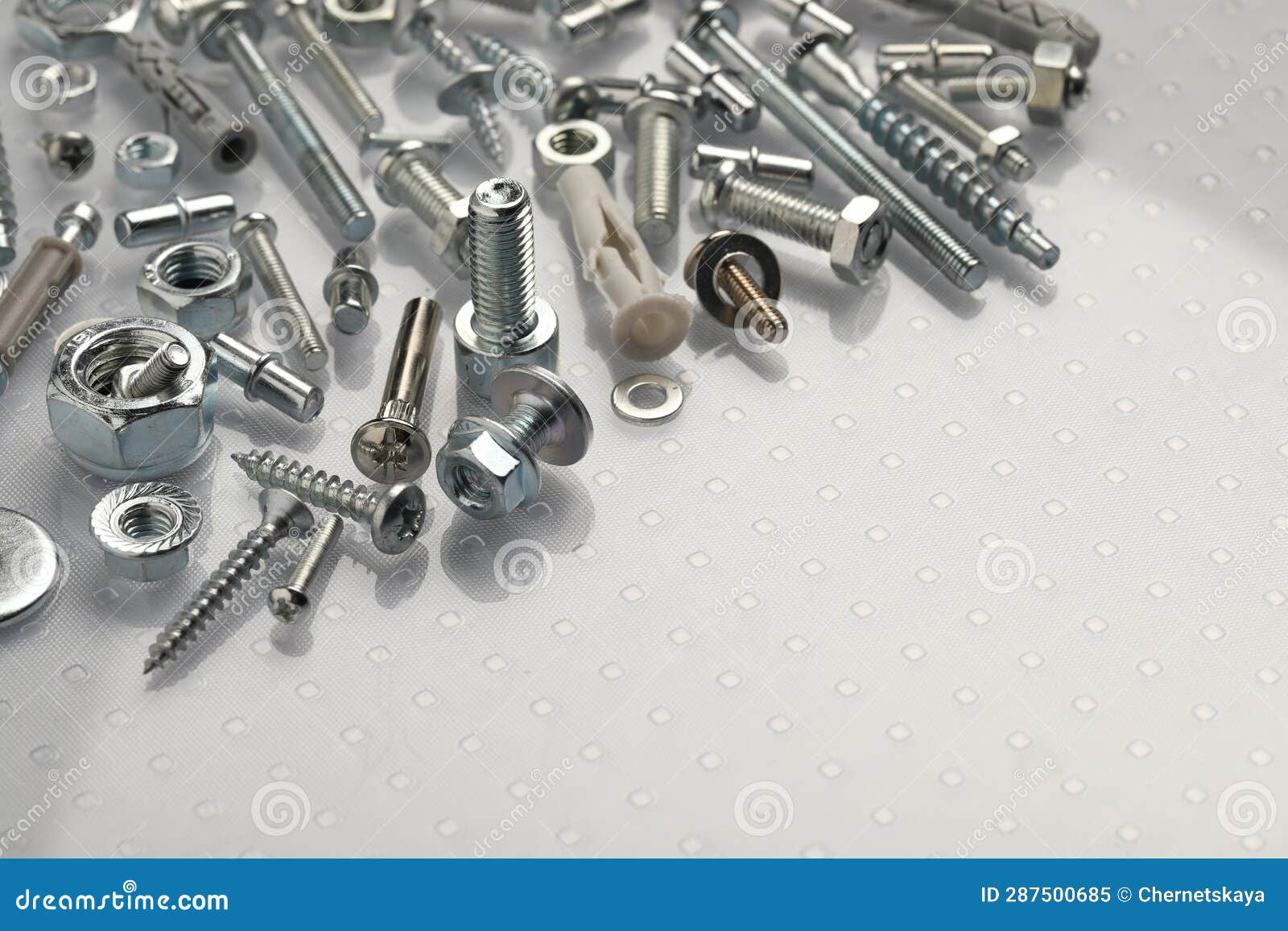 Many Different Fasteners on Plastic Surface, Closeup. Space for Text ...