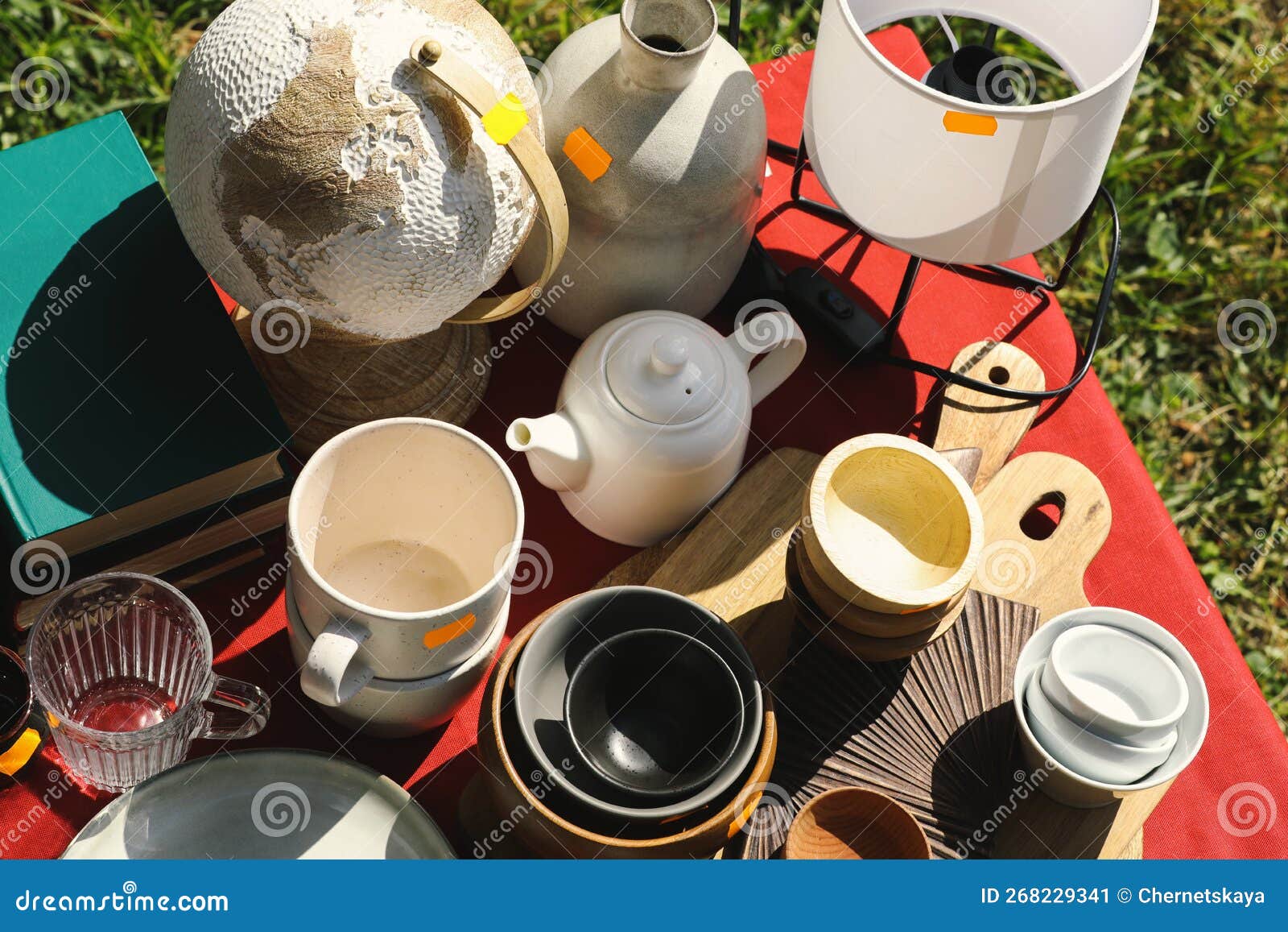 Many Different Items on Table Outdoors, Above View. Garage Sale Stock ...