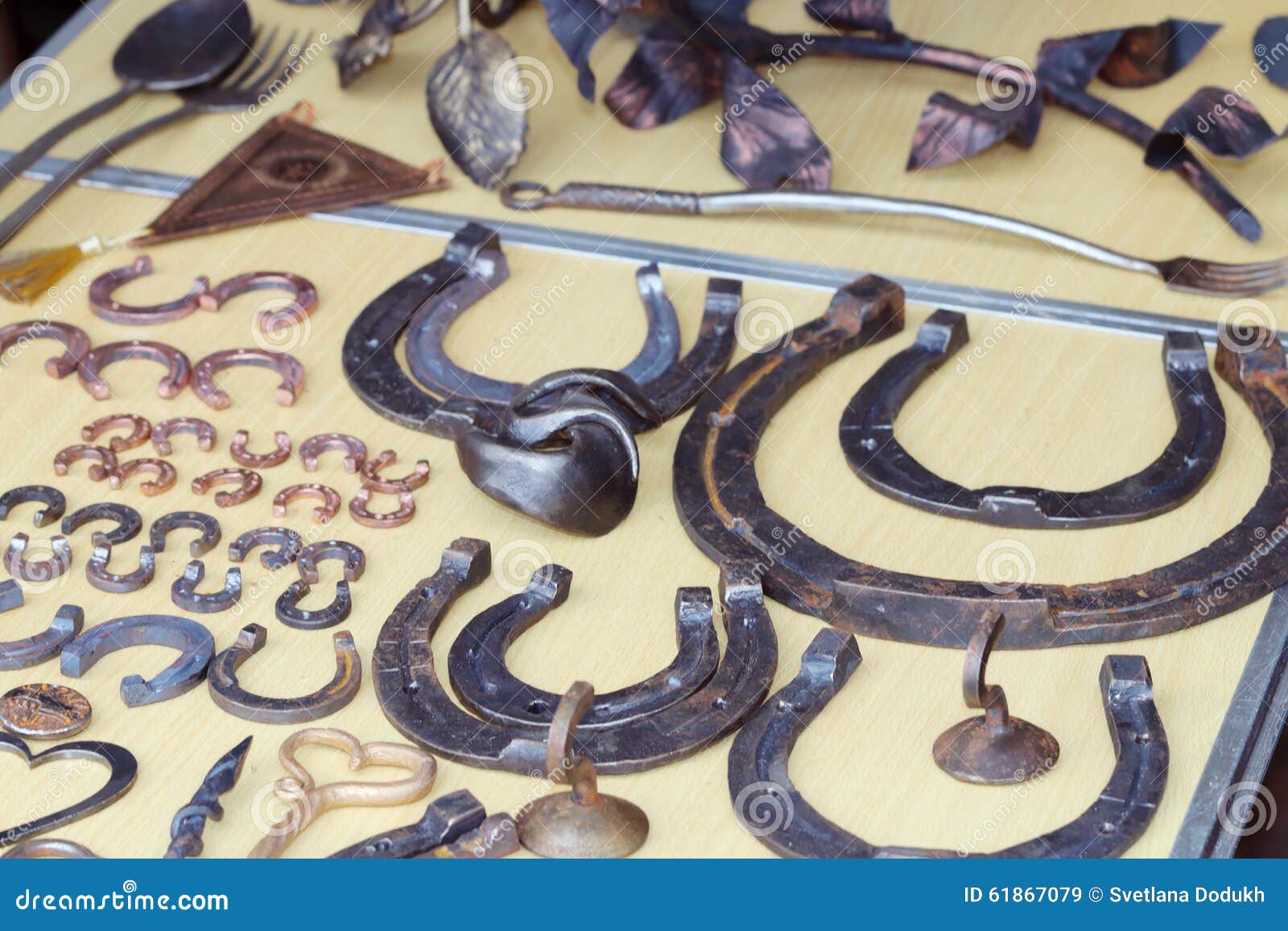 Many Different Metal Horseshoes and Forged Objects Stock Image - Image ...