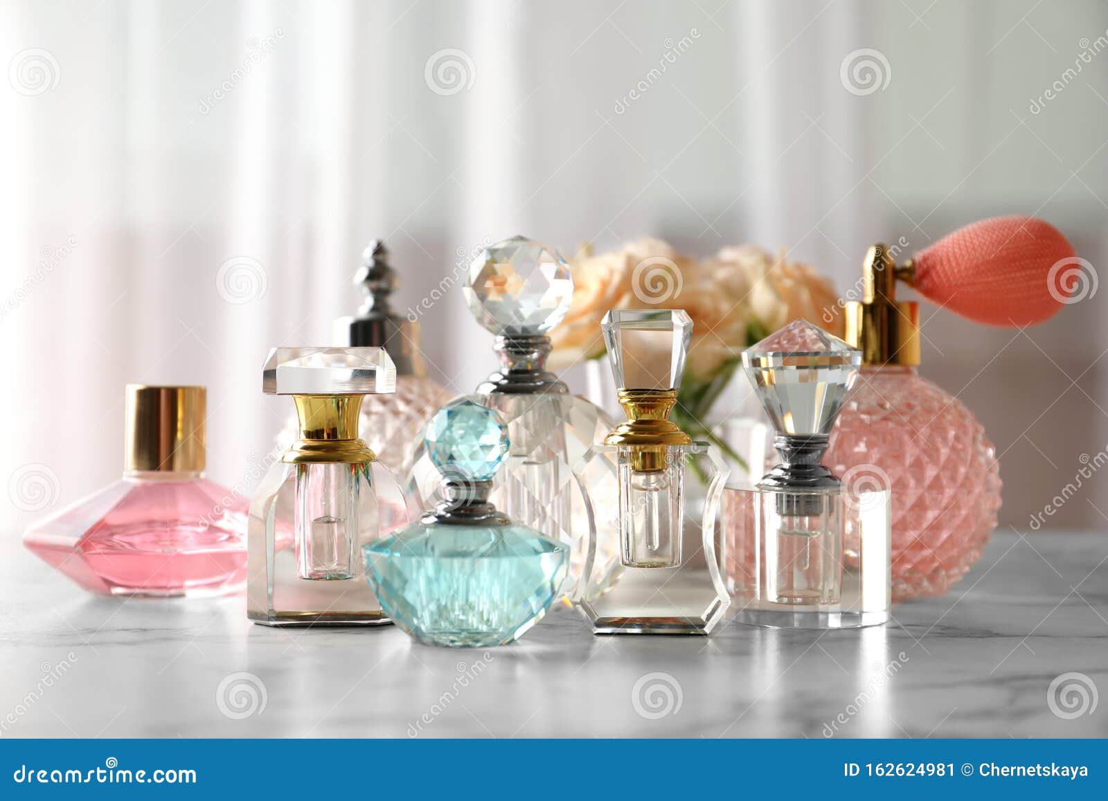 Many Different Perfume Bottles on Table Stock Image - Image of glass ...