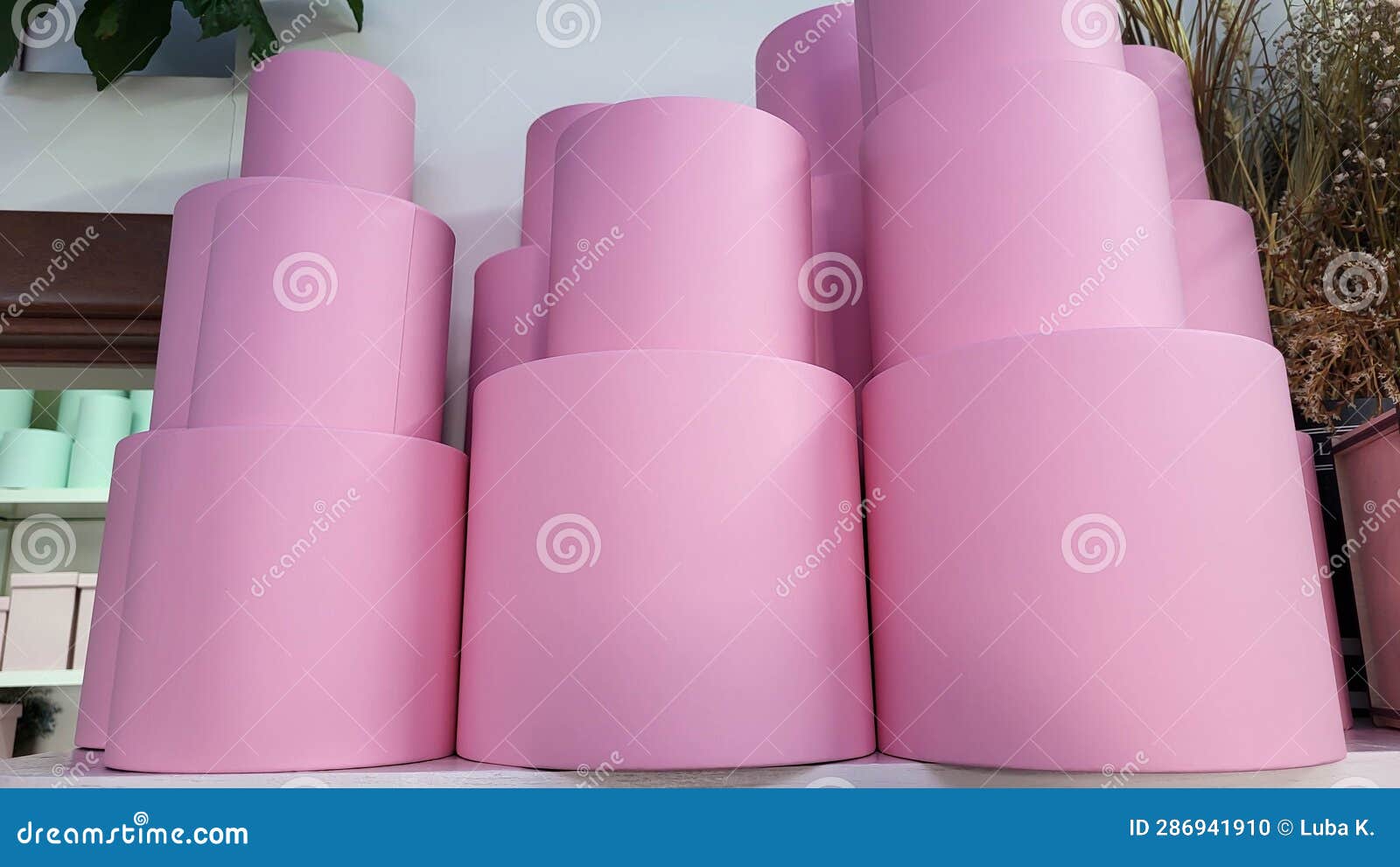 Many Different Pink Round Gift Boxes with a Lid on the Shelf in the ...