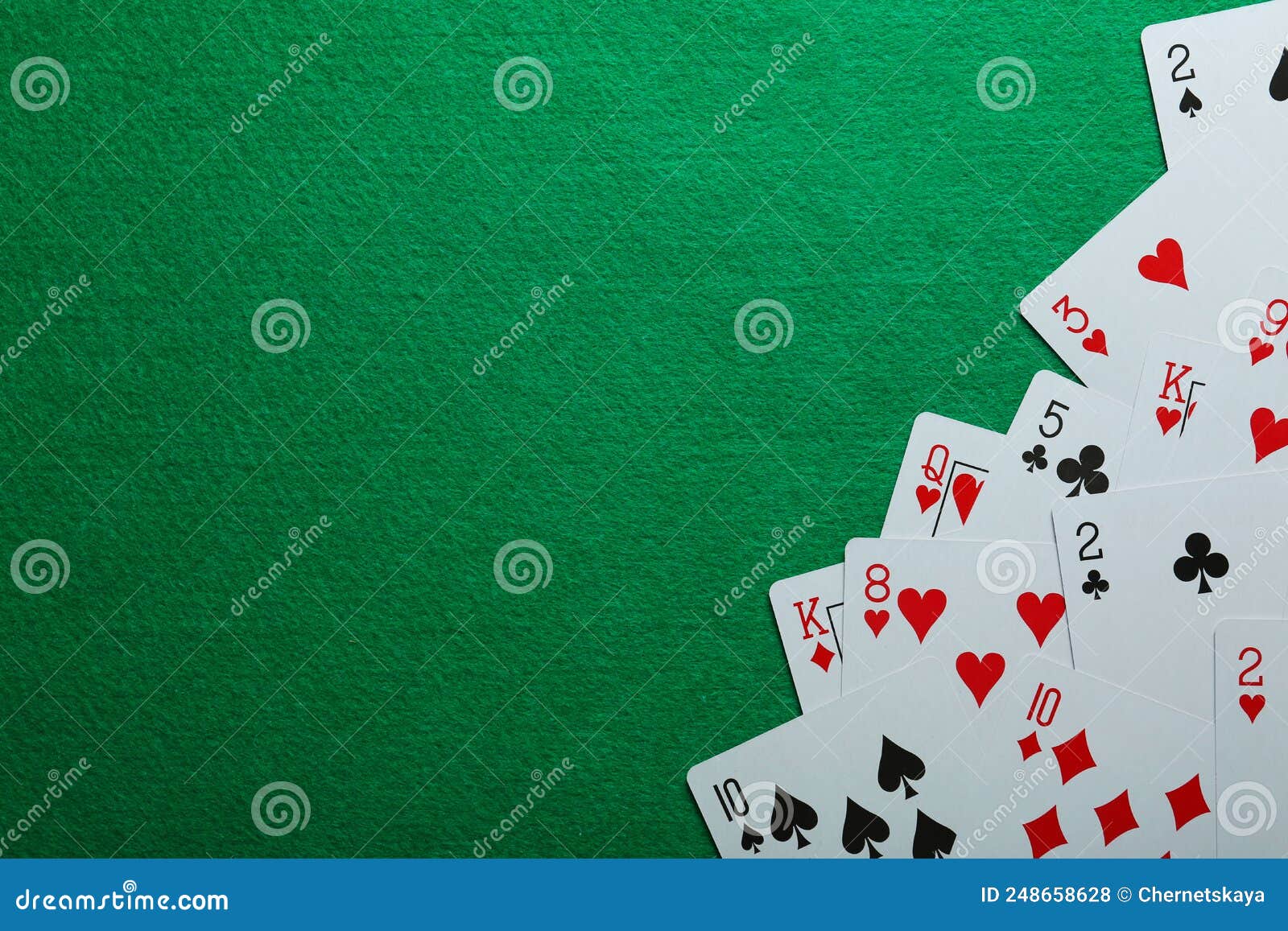 Many Different Playing Cards on Green Table, Flat Lay. Space for Text ...