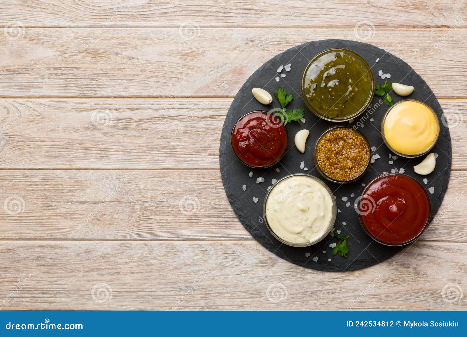 Many Different Sauces and Herbs on Table, Flat Lay Top View. Sauces on ...