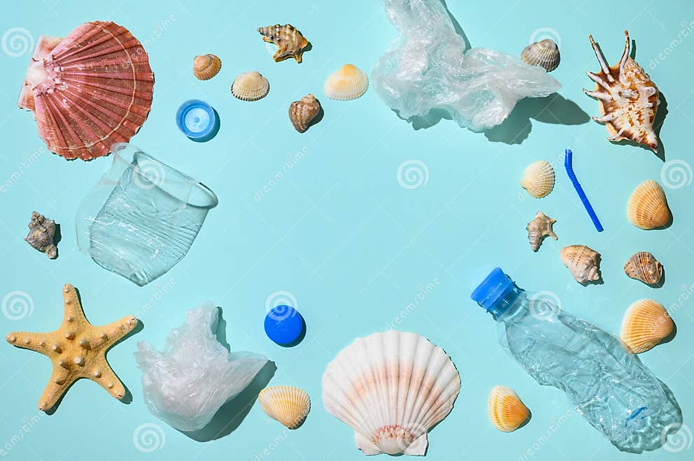 Many Different Seashells and Plastic Trash on a Blue Background. Stock ...