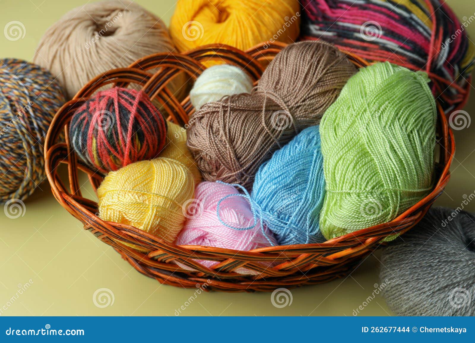 Many Different Soft Woolen Yarns on Yellow Background Stock Photo ...