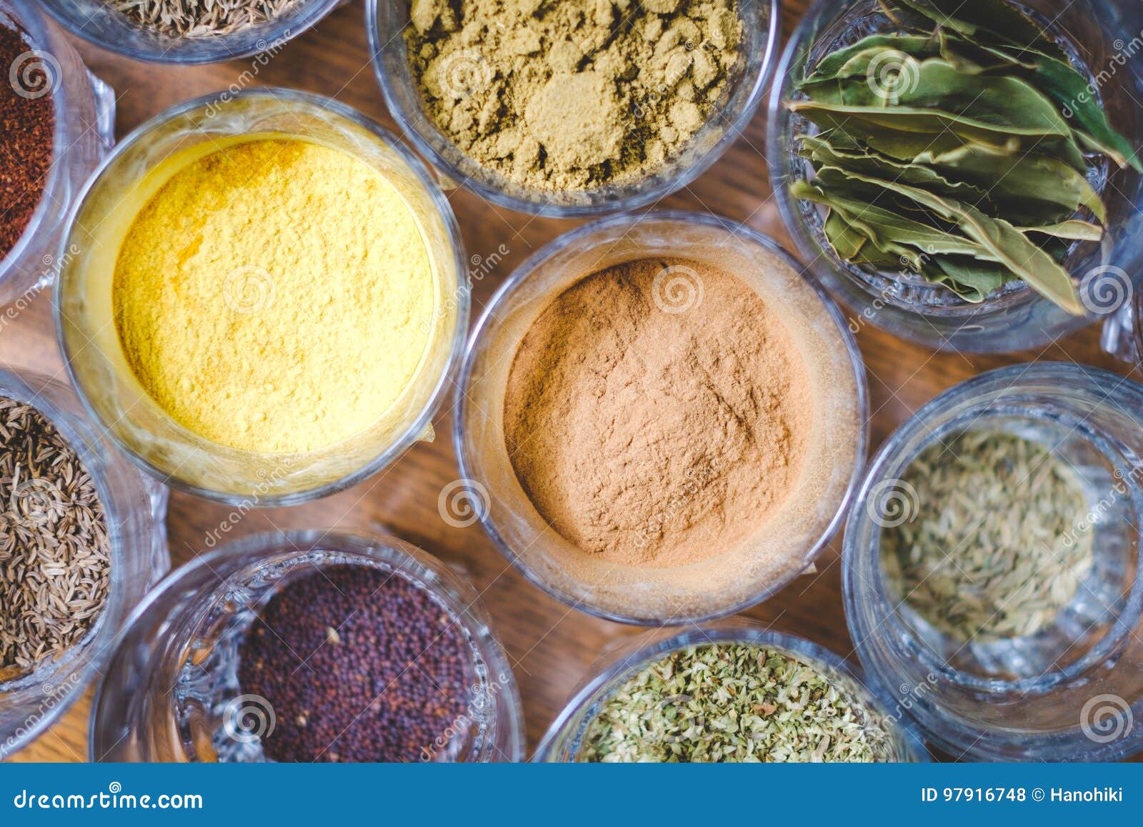 Many Different Spices in Glasses on Table Stock Photo - Image of ...