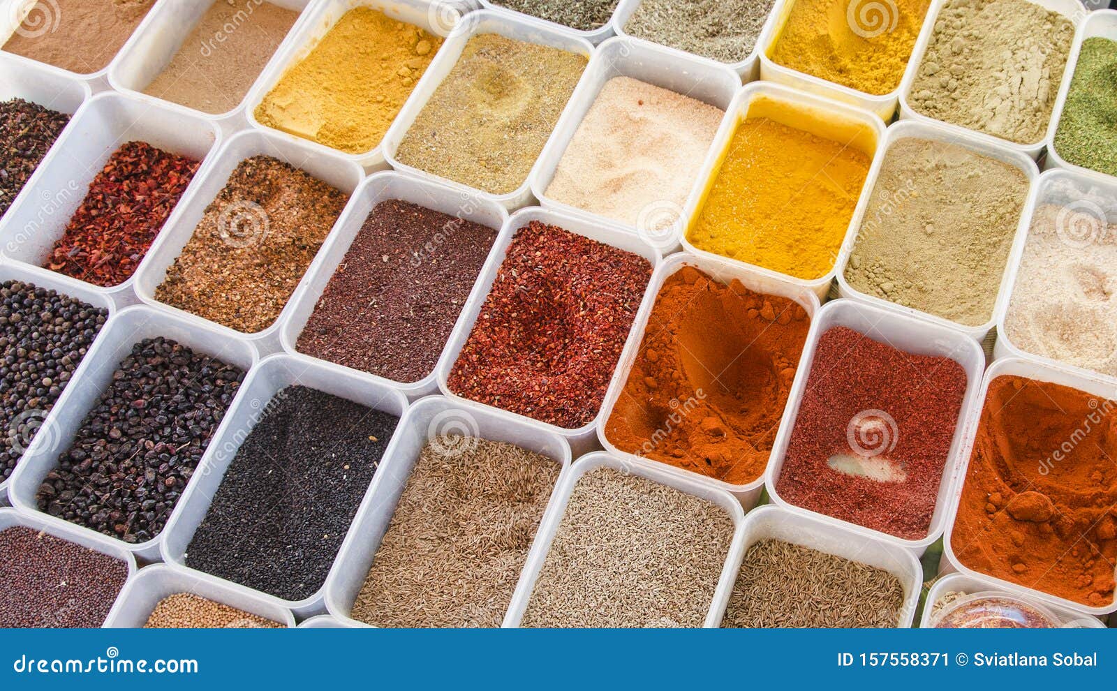 Many Different Spicy Fragrant Multi-colored Condiments in Containers ...