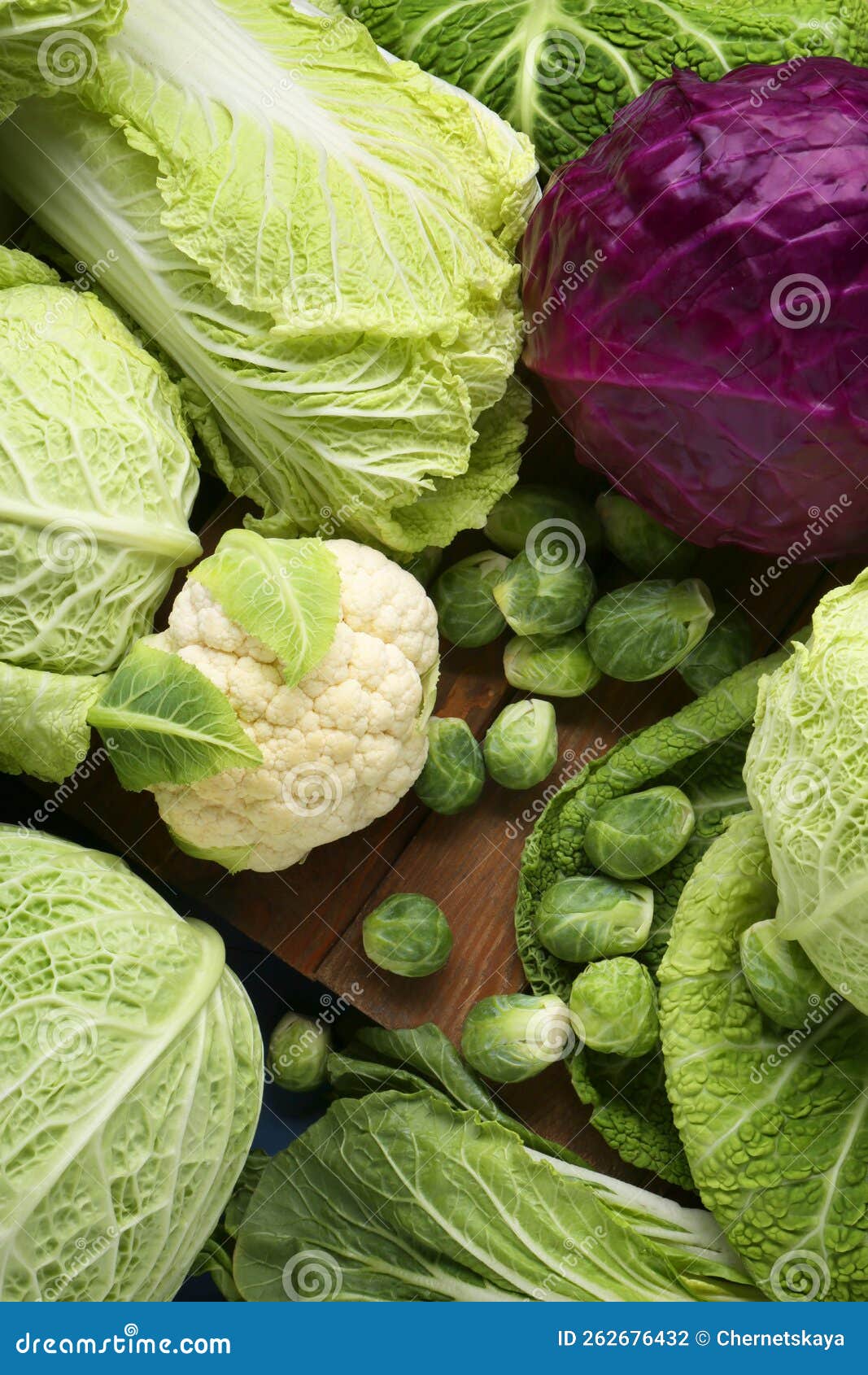 Many Different Types of Cabbage on Wooden Table, Flat Lay Stock Photo ...