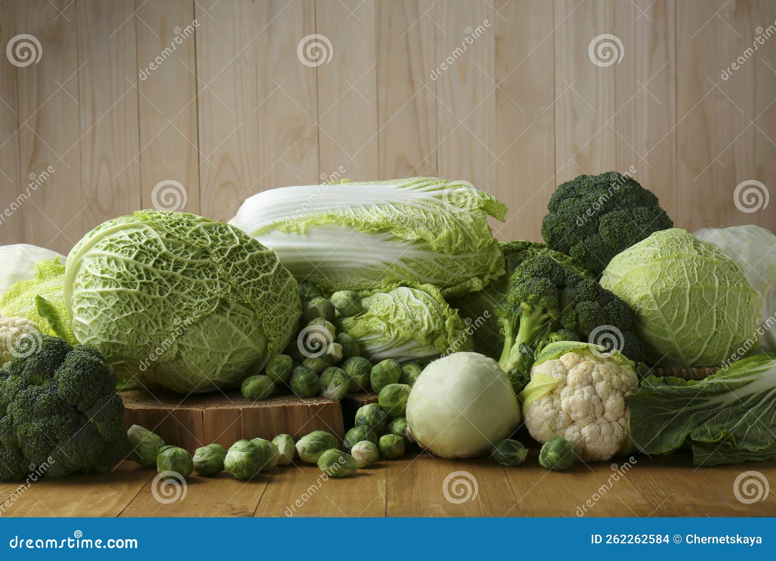 Many Different Types of Fresh Cabbage on Wooden Table Stock Photo ...