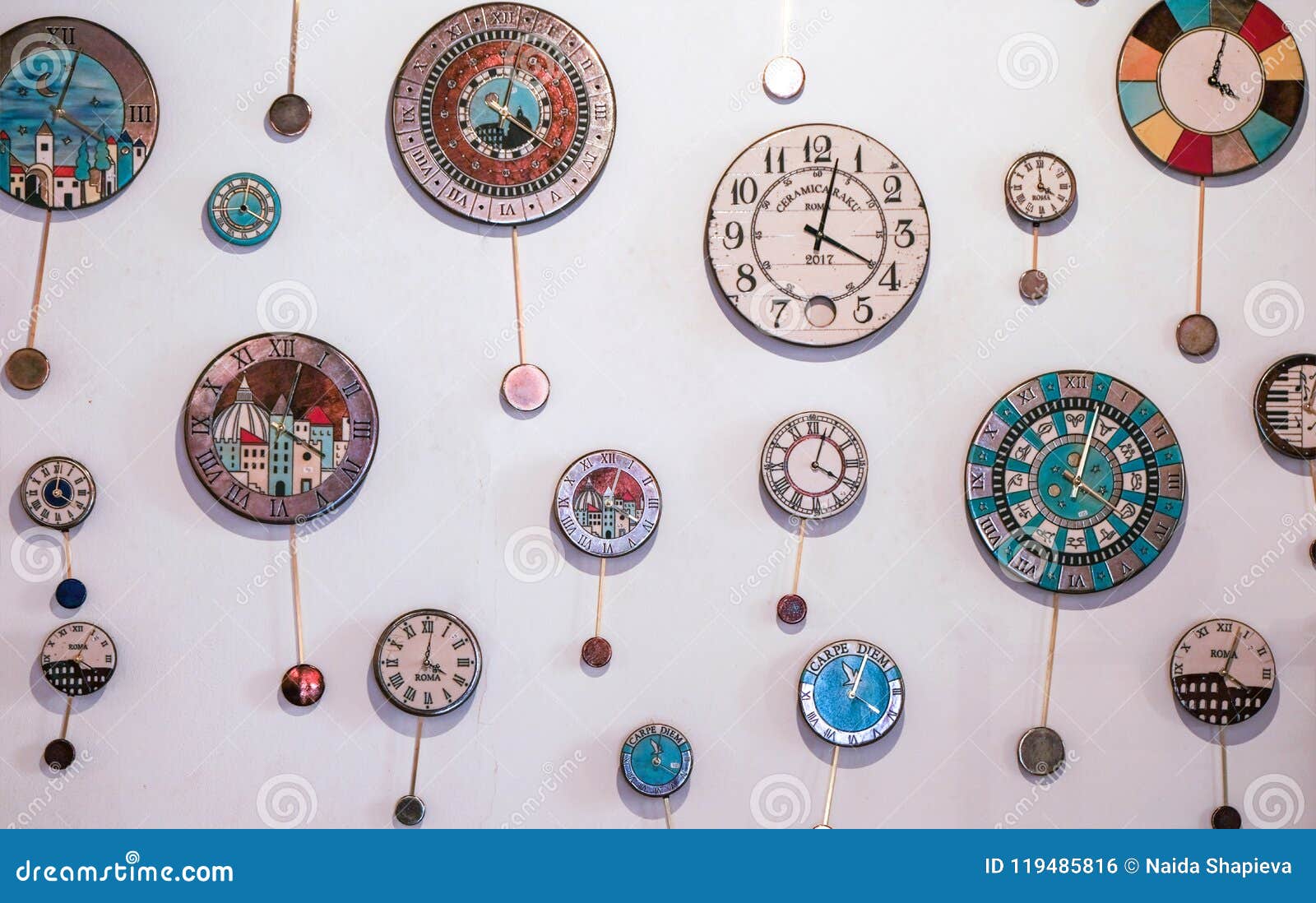 Many Different Wall Clock on the Wall Stock Photo - Image of instrument ...