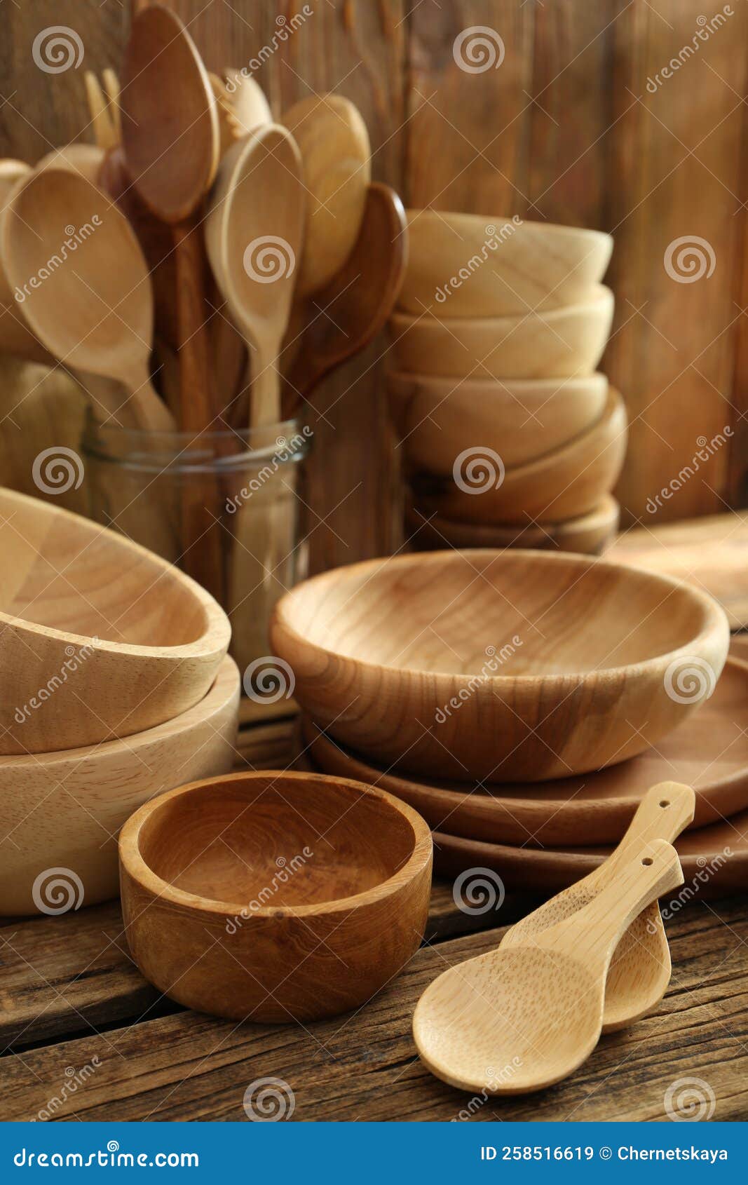 Many Different Wooden Dishware and Utensils on Table Stock Image ...