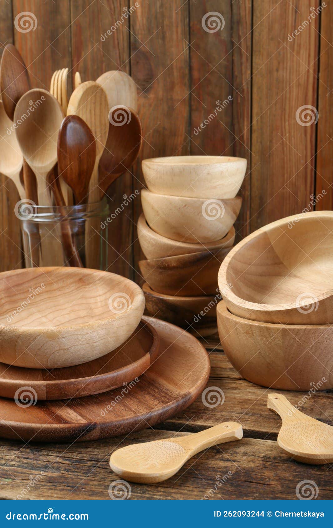 Many Different Wooden Dishware and Utensils on Table Stock Photo ...