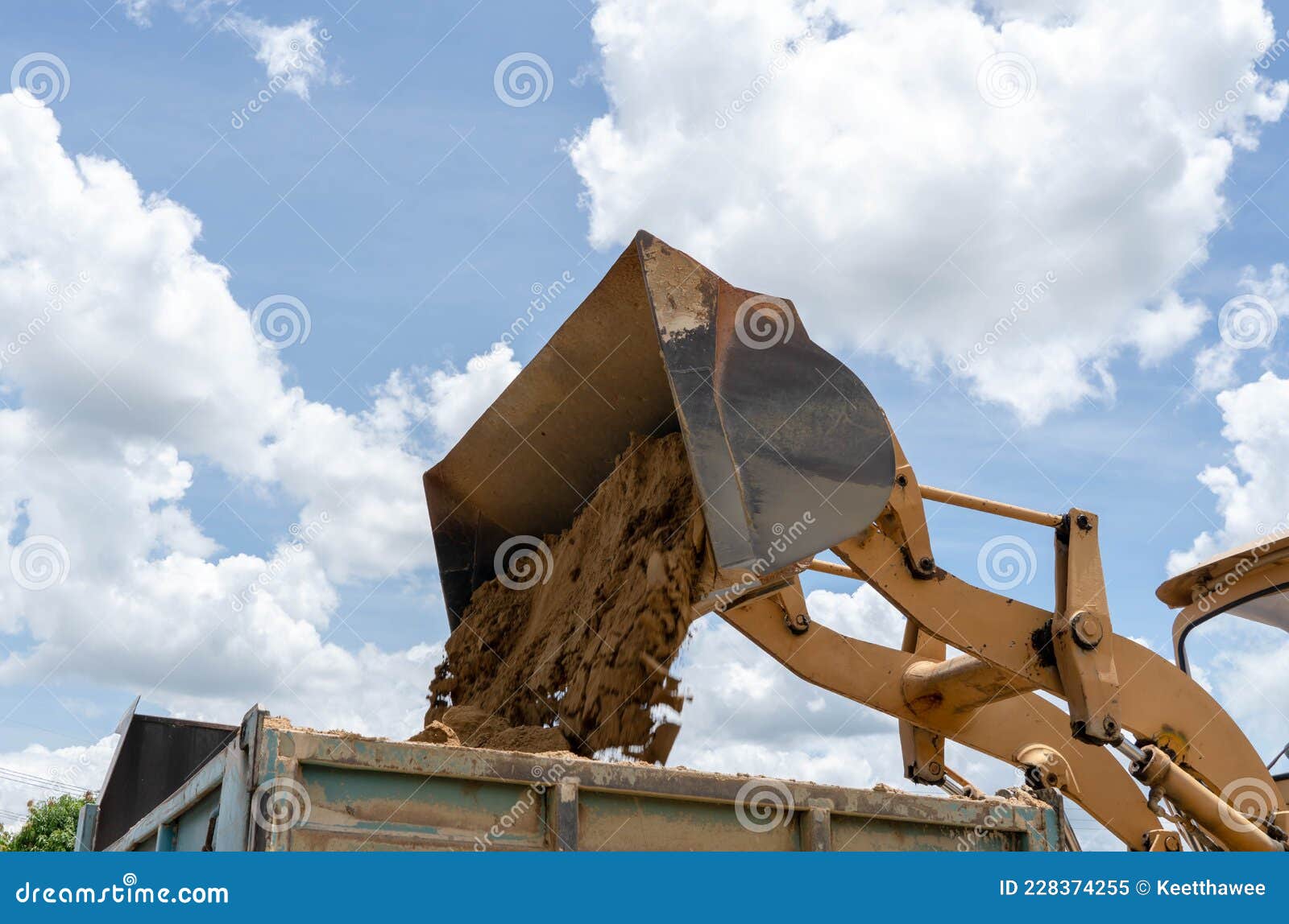 Wheel Loader with Dump Truck Stock Image - Image of cobblestone, earth ...