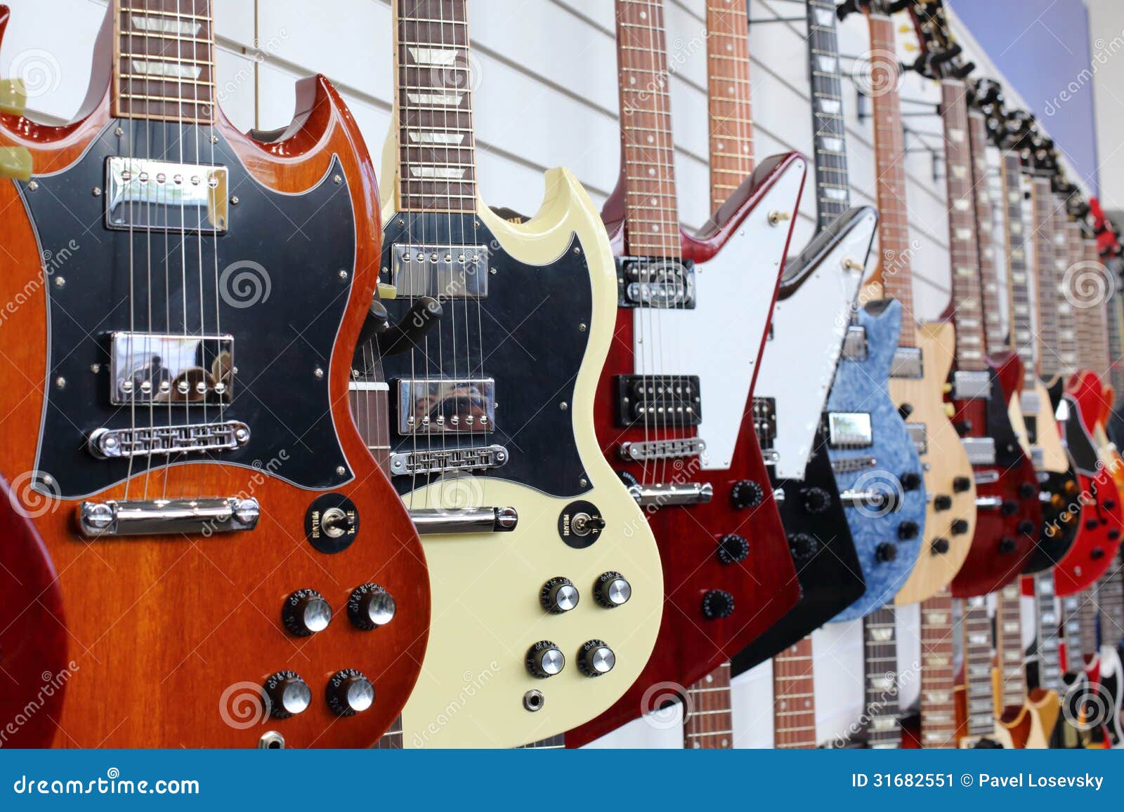 Many Electric Guitars Hanging on Wall Stock Image - Image of jazz ...