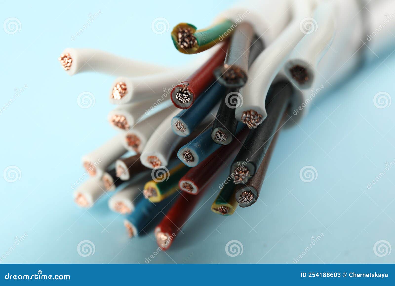 Many Electrical Wires on Light Blue Background, Closeup Stock Image ...