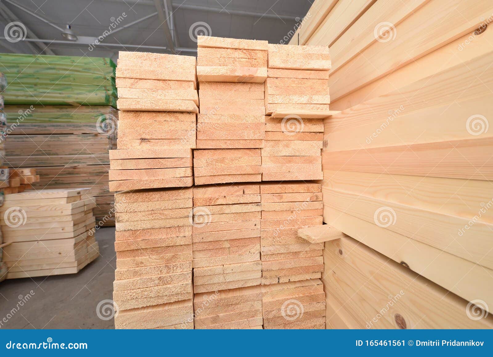Many Folded Wooden Planks In A Warehouse With A Forest Royalty-Free ...