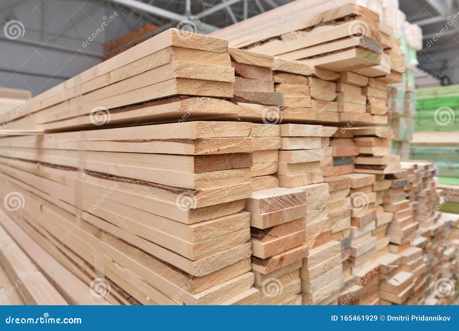 Many Folded Wooden Planks in a Warehouse with a Forest Stock Image ...