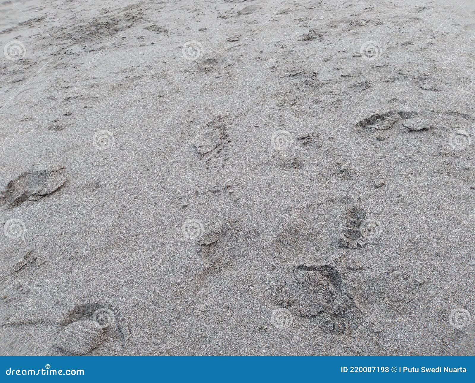 Many Footprints in the Clean Beach Sand Stock Photo - Image of clean ...
