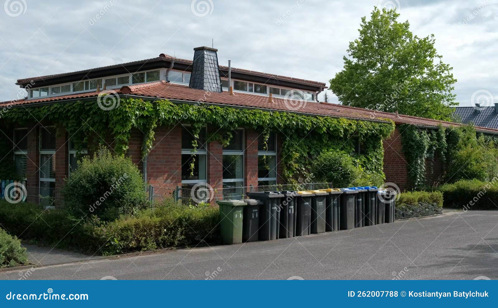 Many Garbage Cans with Sorted Garbage. Sorting Garbage. Lids of ...