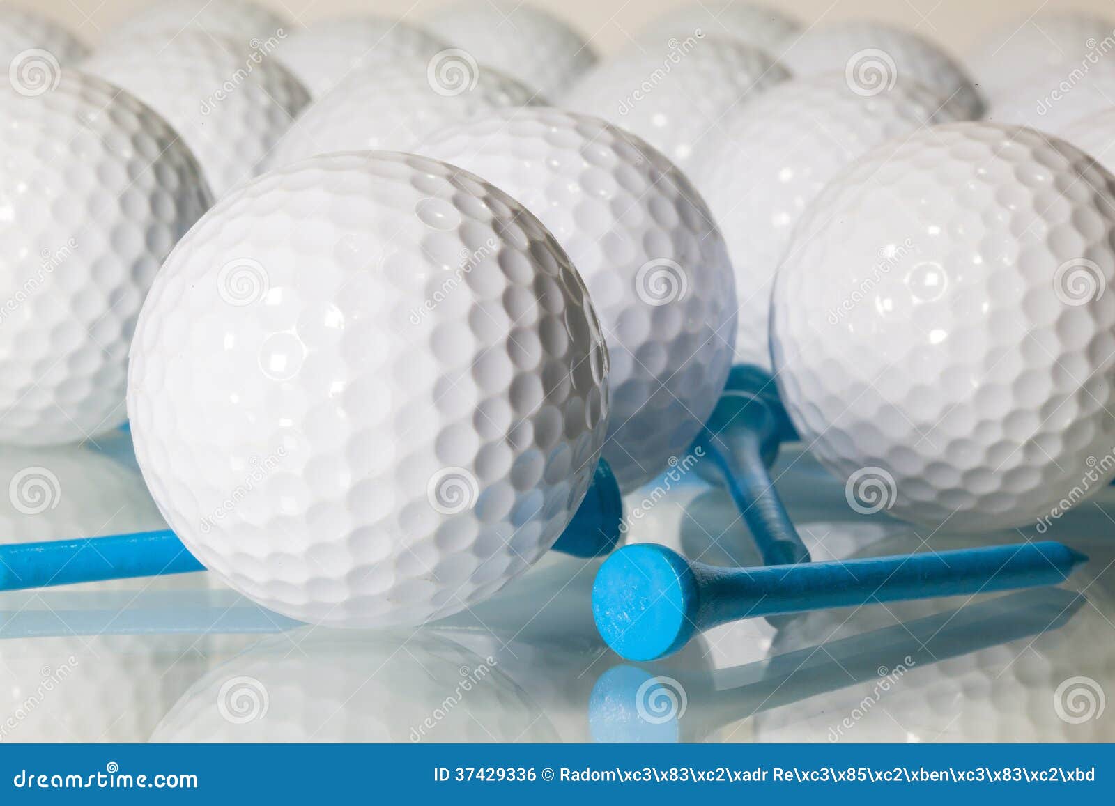 Many Golf Balls on a Glass Table Stock Photo - Image of glossy, pattern ...