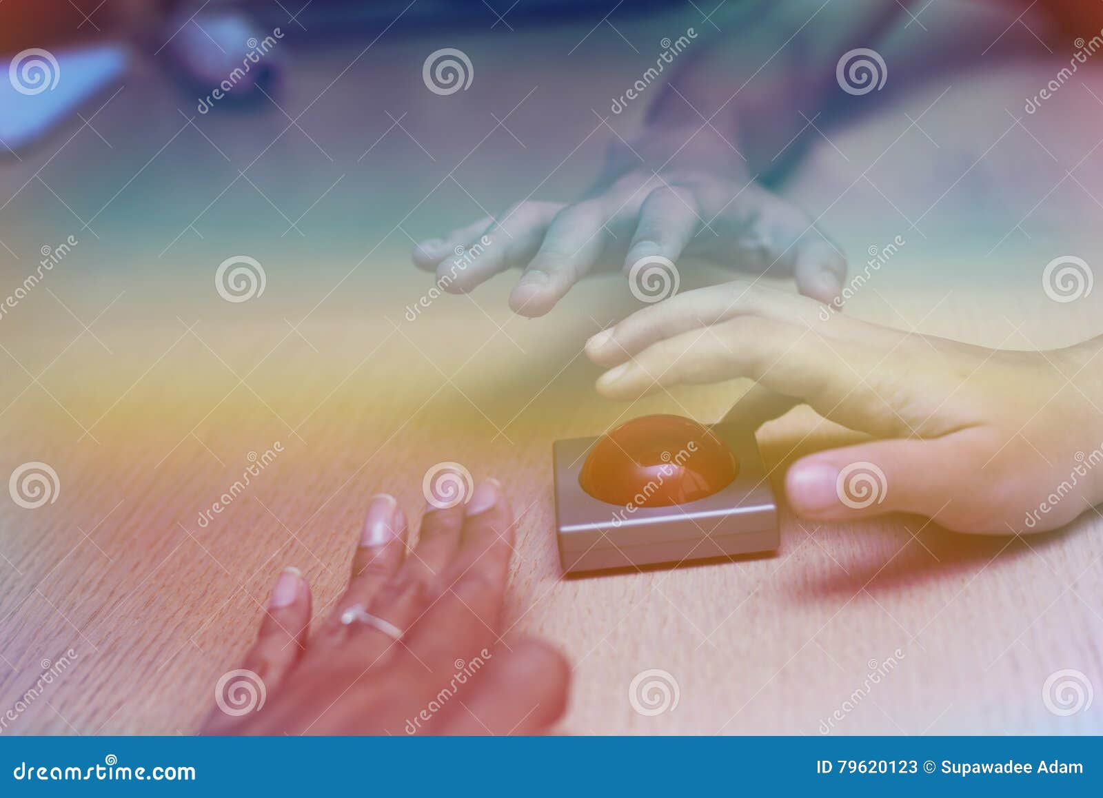 Many Hand Grab for the Red Button on Wood Table. Stock Image - Image of ...