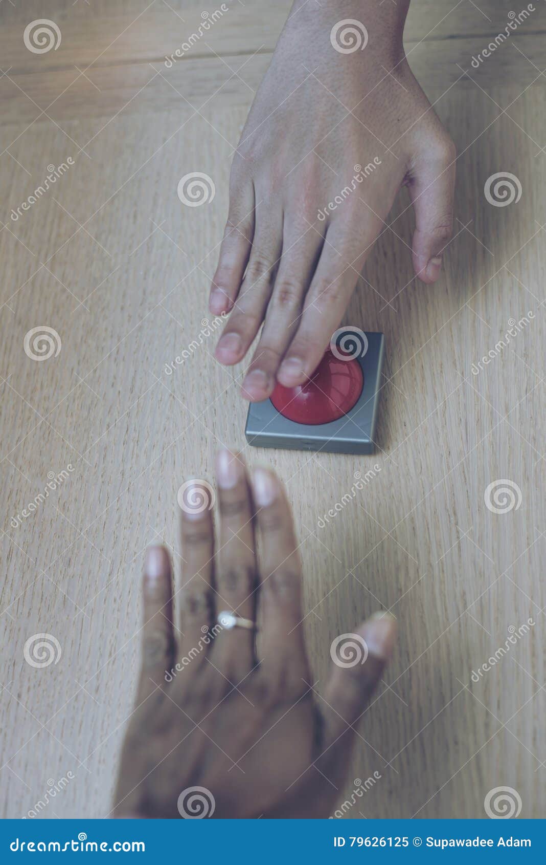 Many Hand Grab for the Red Button on Wood Table. Stock Image - Image of ...