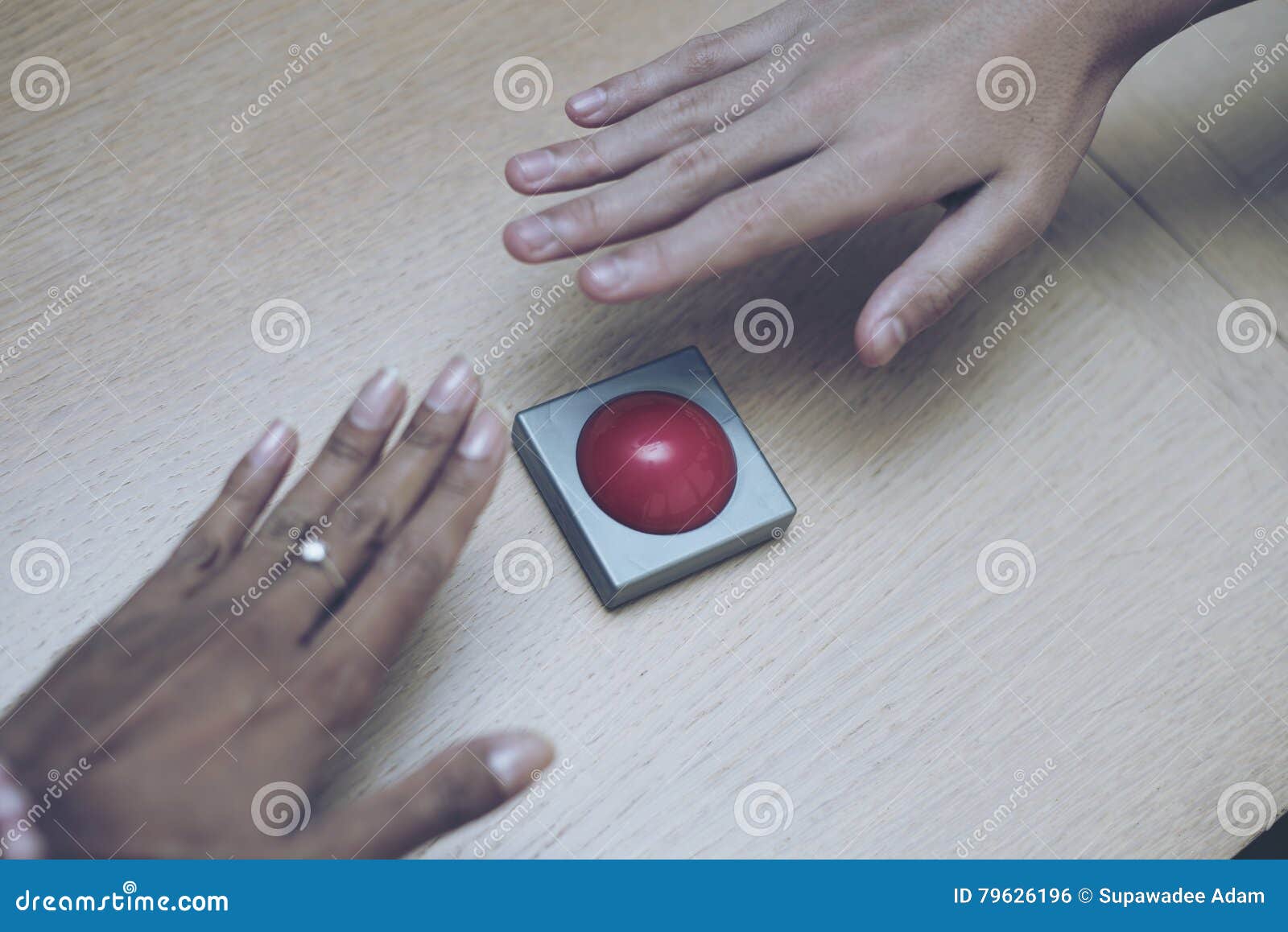 Many Hand Grab for the Red Button on Wood Table. Stock Photo - Image of ...
