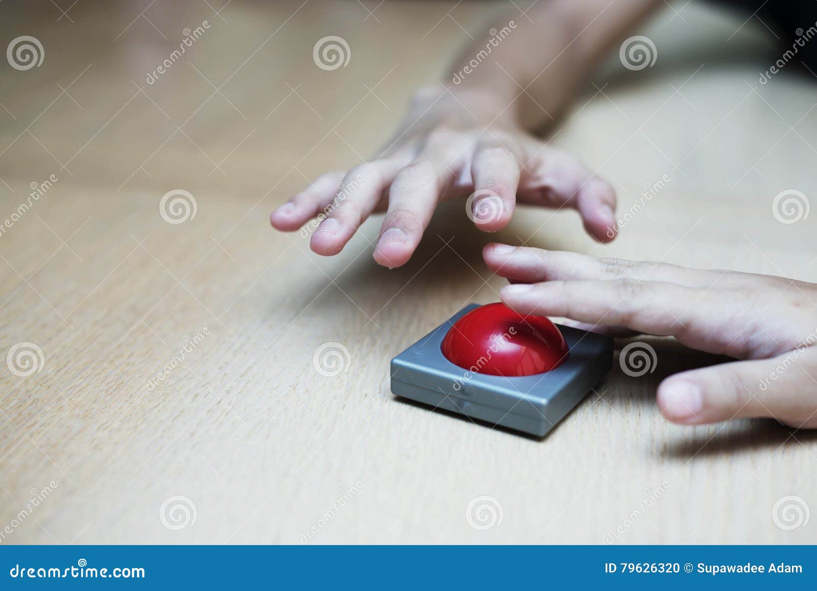 Many Hand Grab for the Red Button on Wood Table. Stock Photo - Image of ...