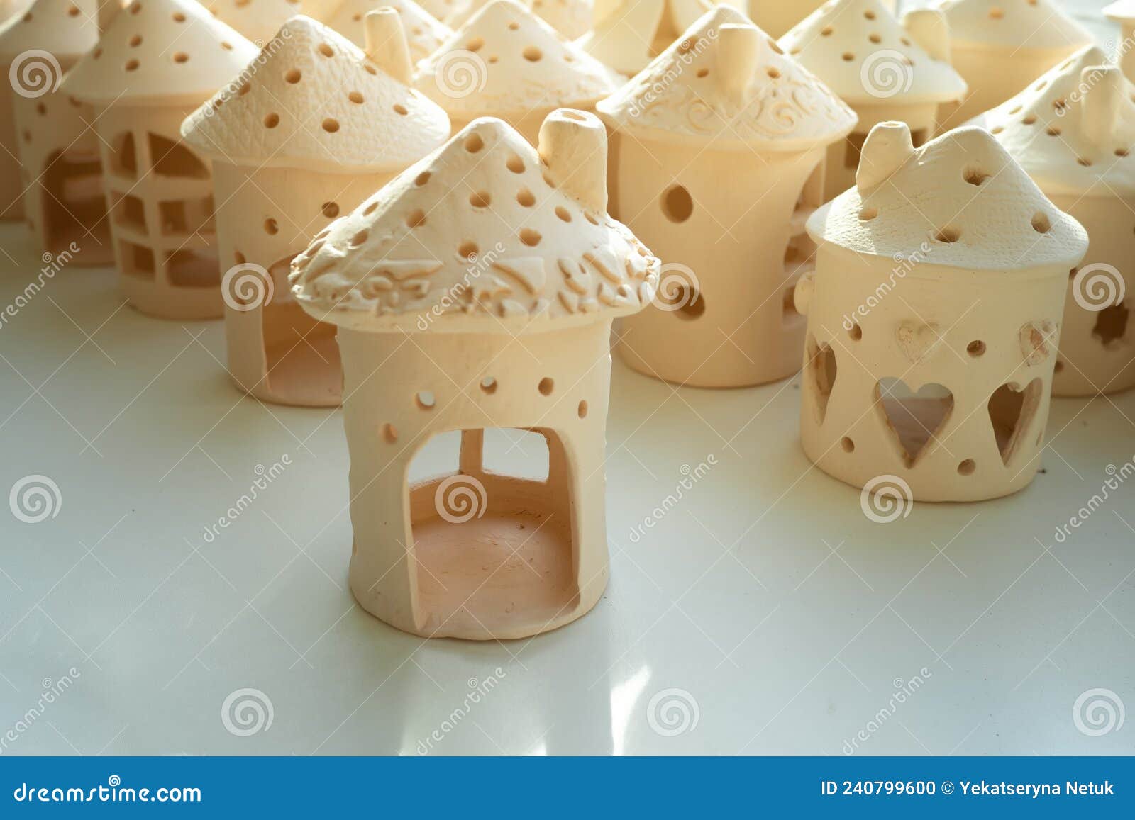 Many Handmade Clay Candlesticks on Table in the Workshop. Art Stock ...