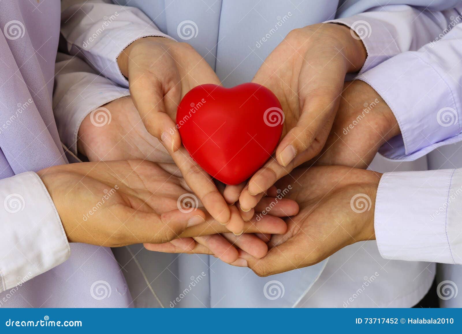 Many hands and a red heart stock photo. Image of target - 73717452
