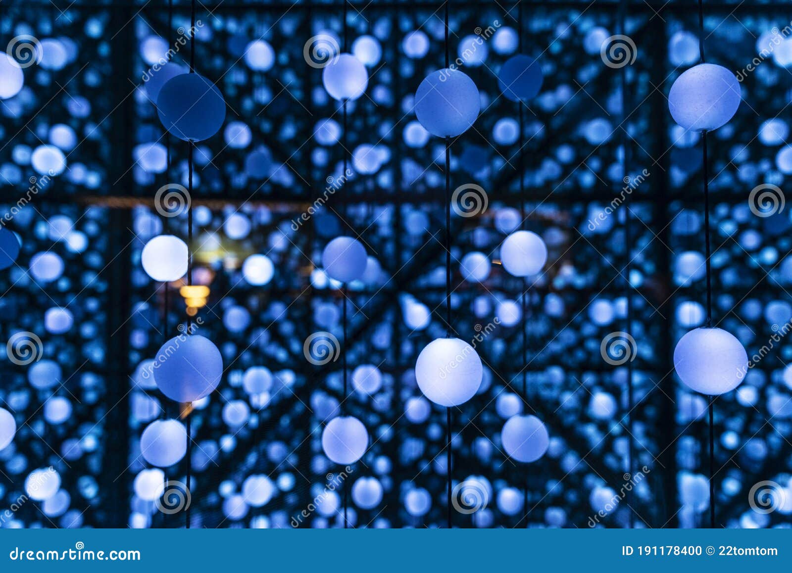 Many Illuminated Balls Hung As Abstract Blue Background Stock Photo ...