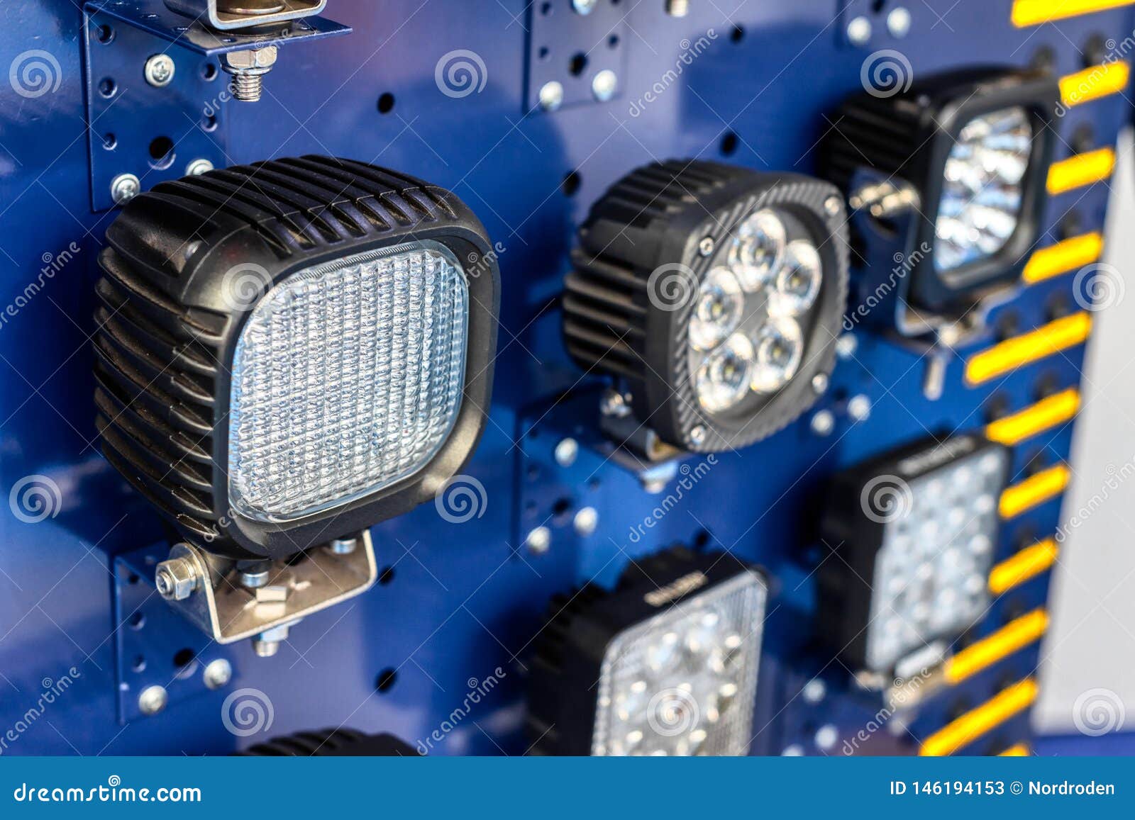Many LED car headlights. stock image. Image of industrial - 146194153