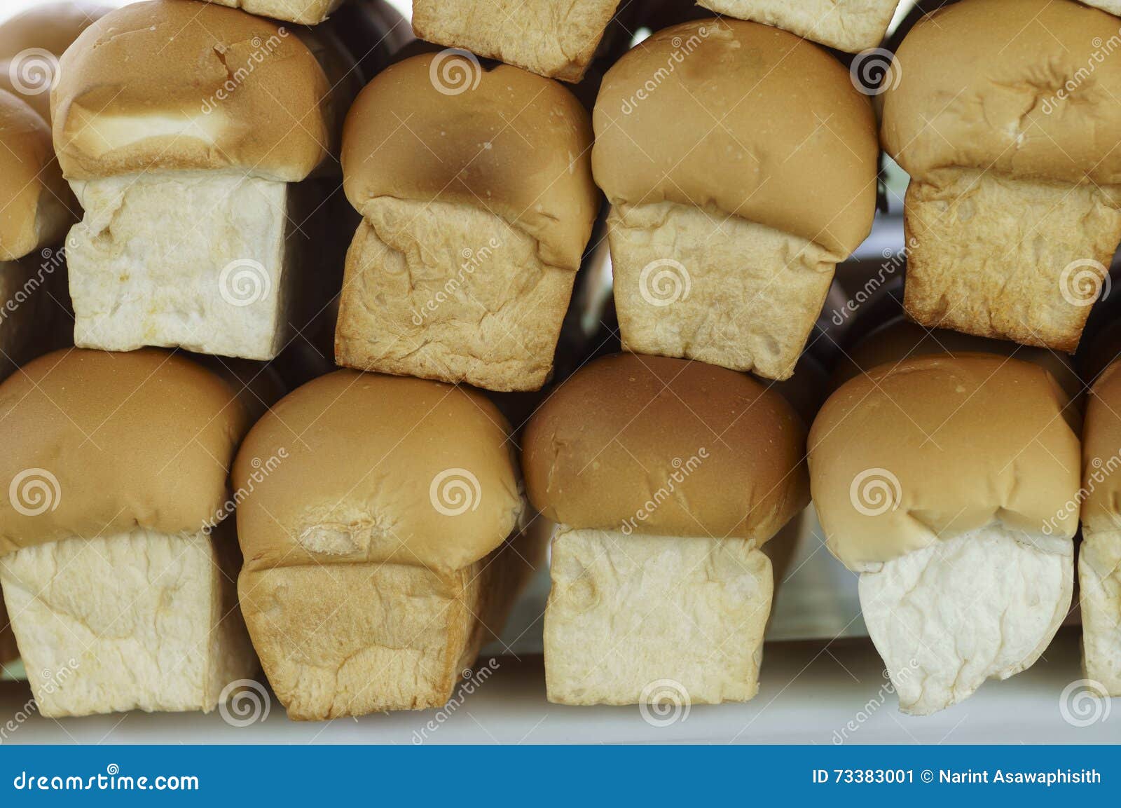 Many loaves of fresh bread stock image. Image of white - 73383001