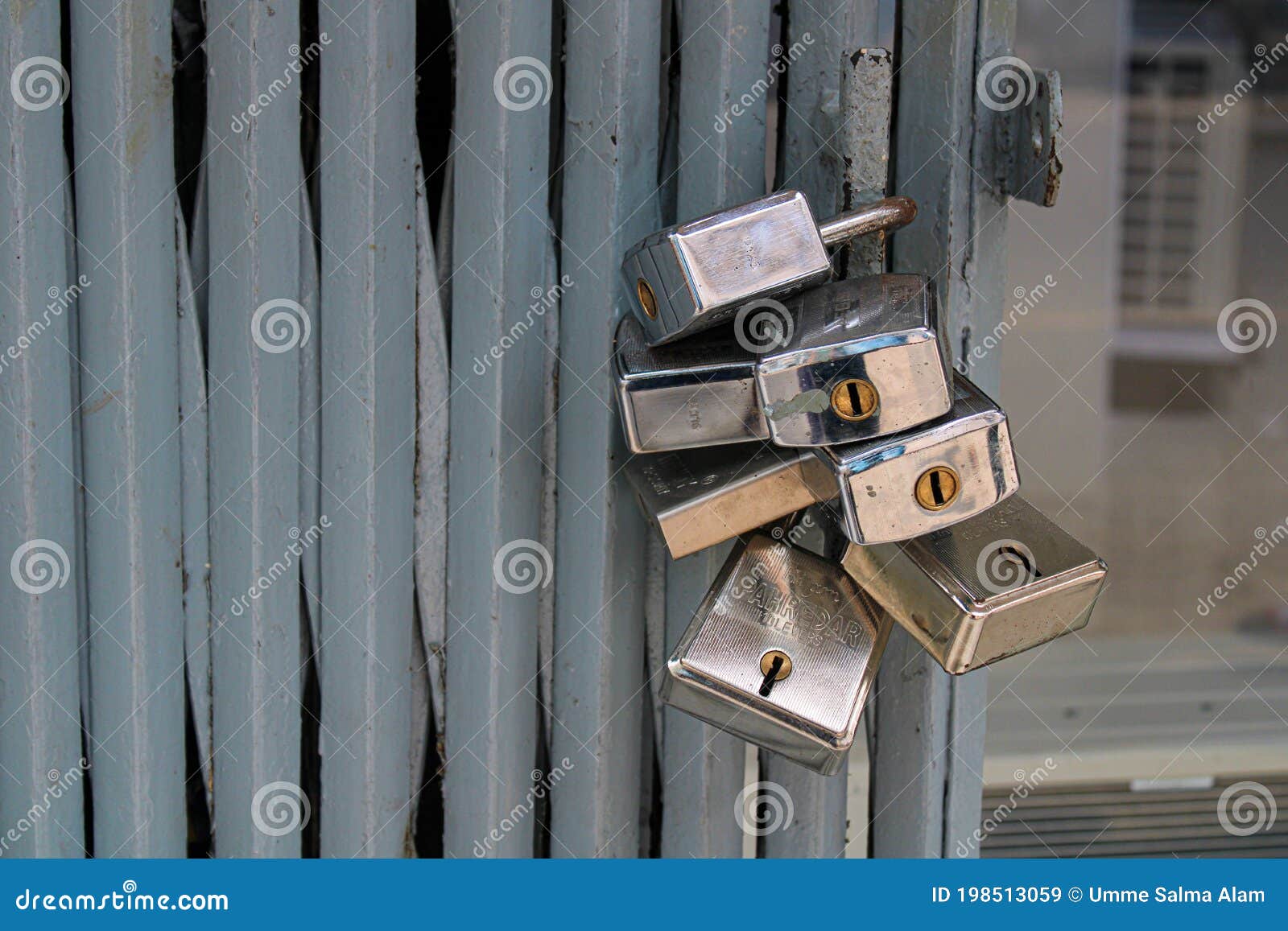 Locks Of Many Colors And Shapes Next To Each Other Hanging From A Chain ...