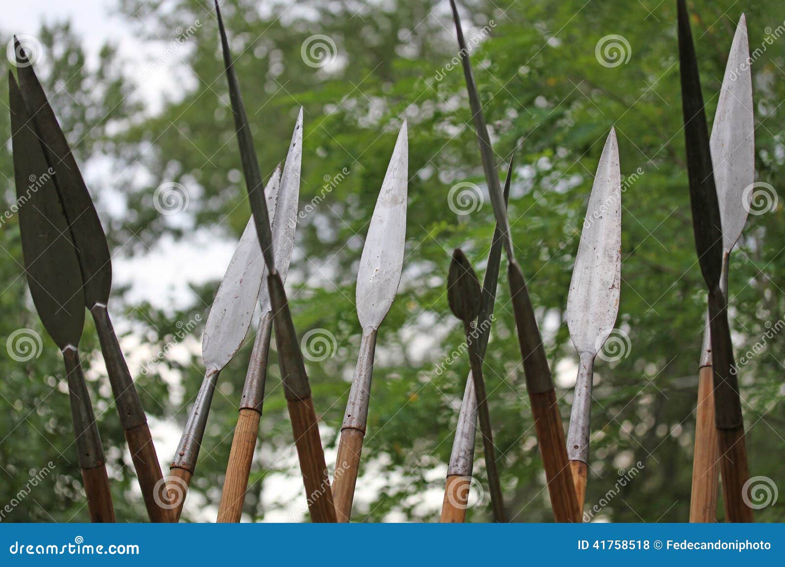 Long Pointy Icicles From Frozen Water Hanging Of The Side Of A Roof ...