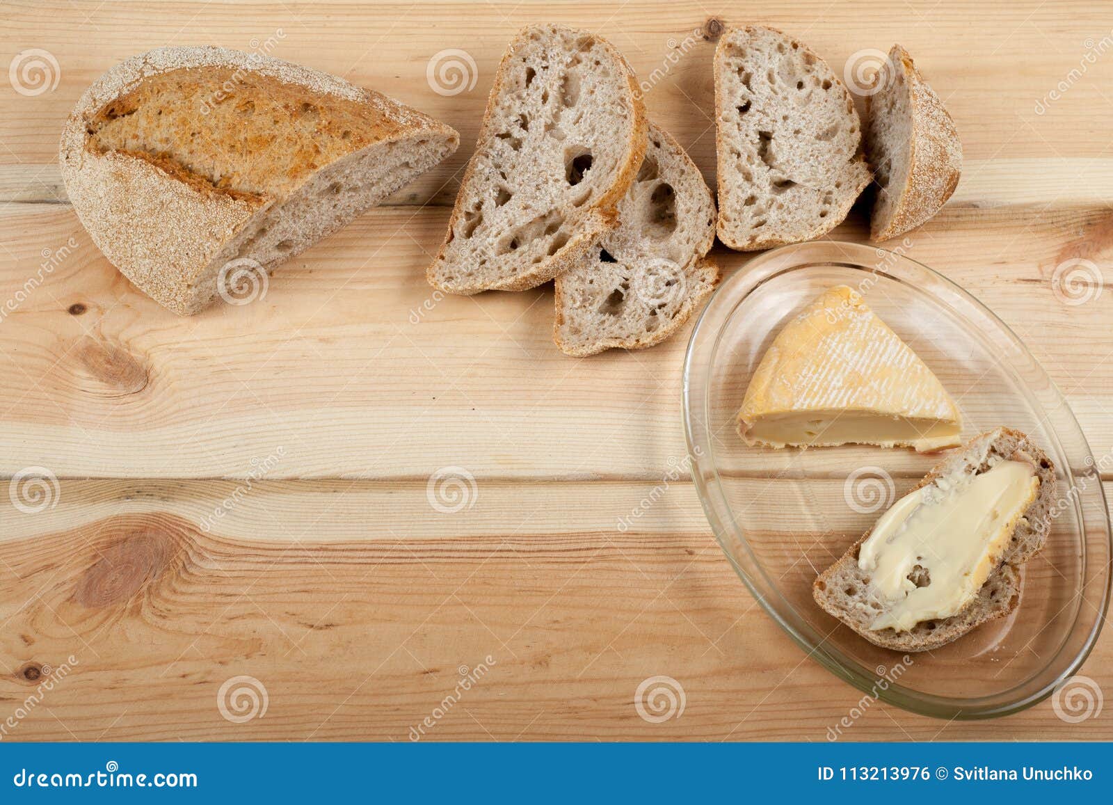 Many Mixed Breads and Rolls of Baked Bread on Wooden Table Background ...