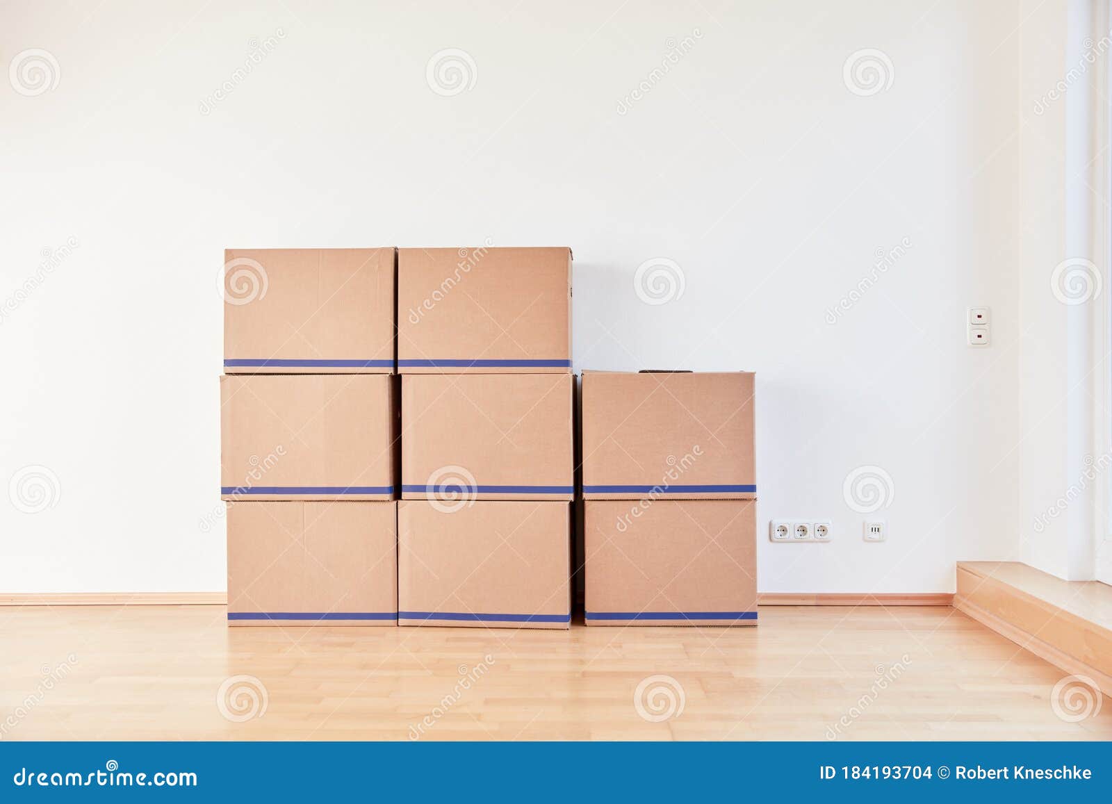 Many Moving Boxes Stacked on Wall when Moving Stock Photo - Image of ...