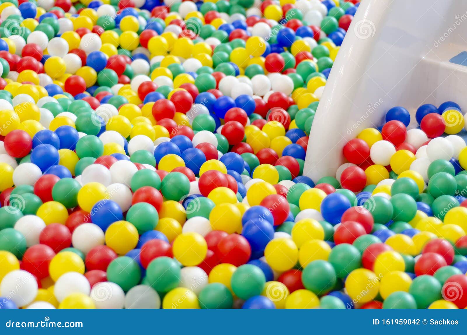 Many Multi-colored Plastic Balls in the Children`s Pool. Stock Photo ...